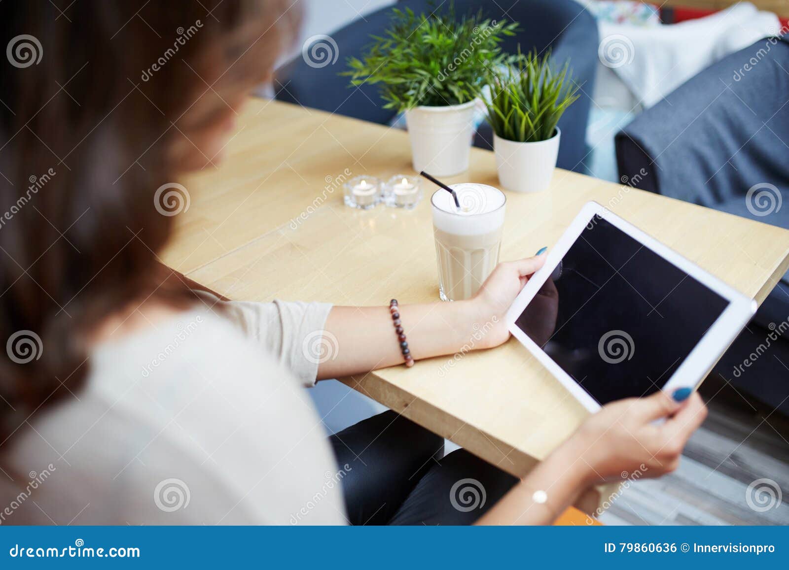 Using tablet at cafe stock photo. Image of inside, horizontal - 79860636