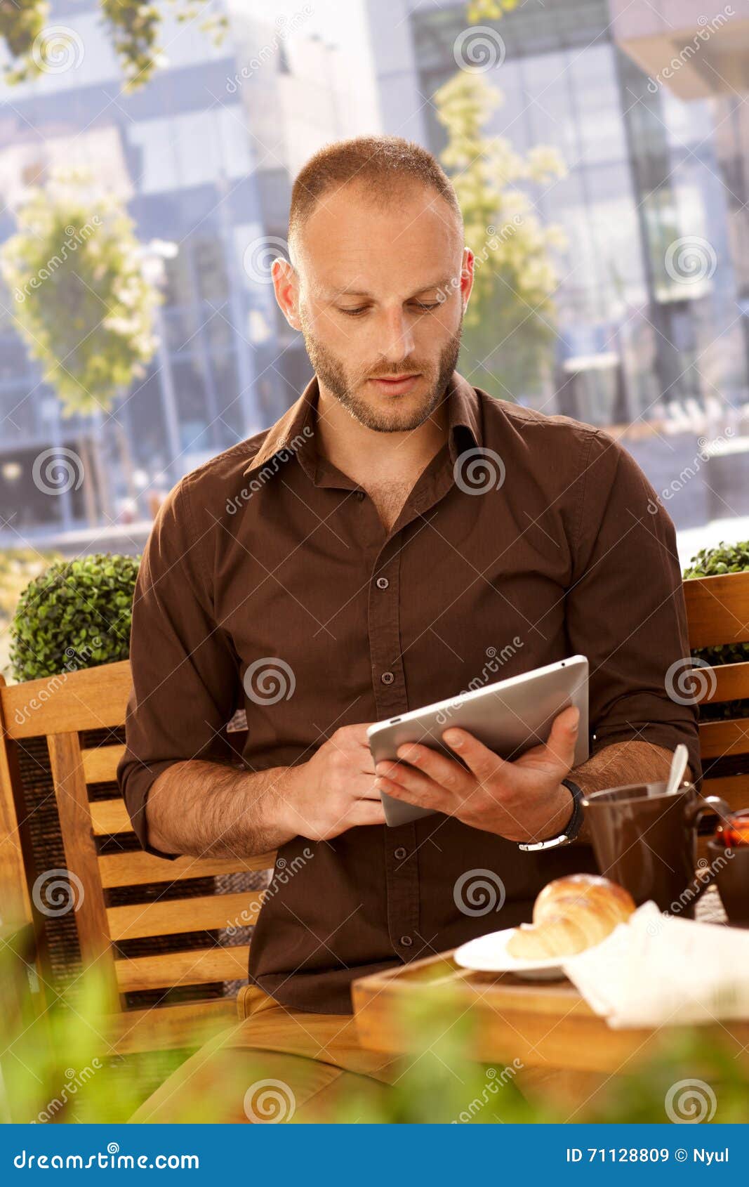Using tablet outdoors stock image. Image of american - 71128809