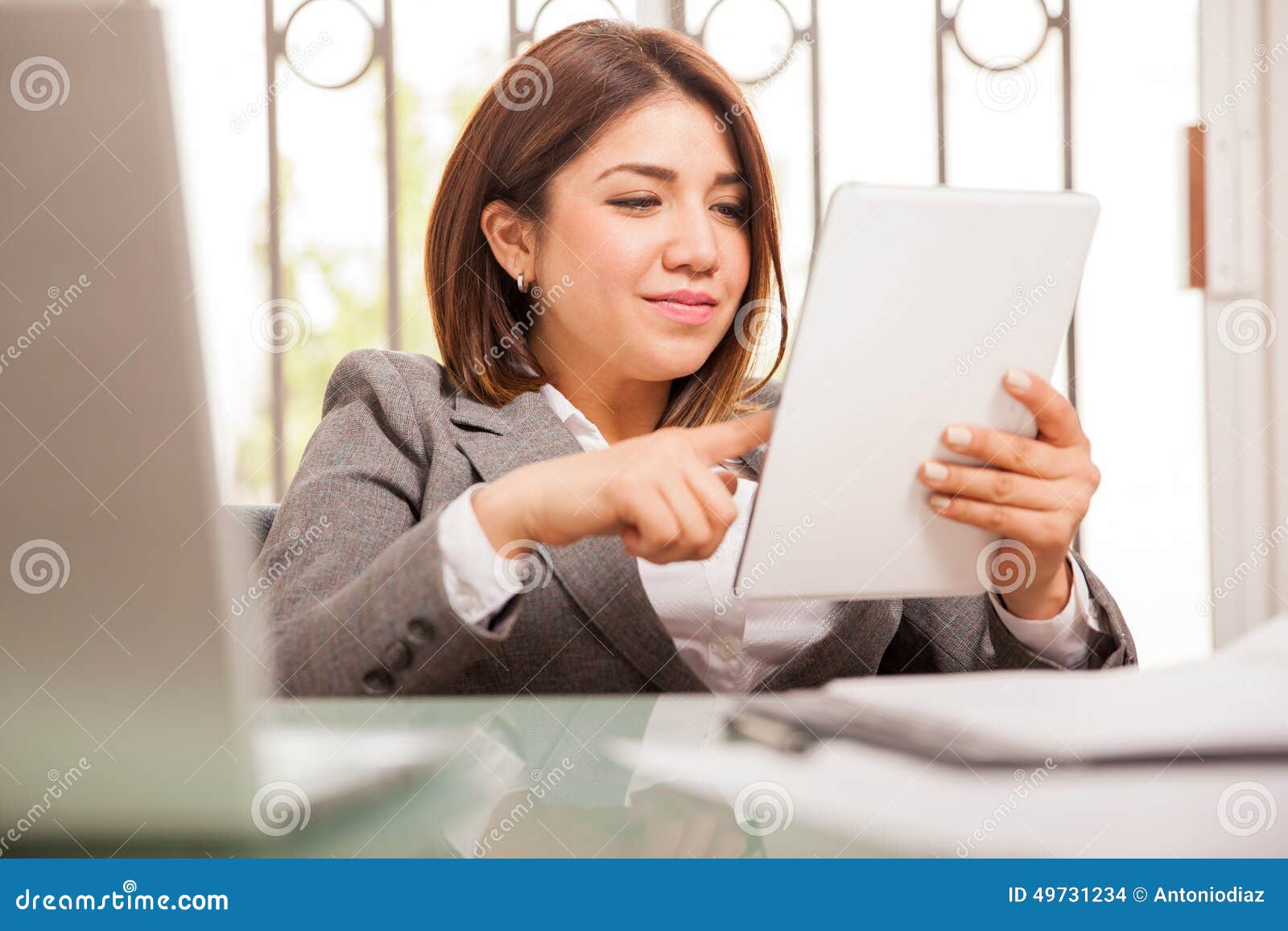 Using a tablet at work stock photo. Image of girl, office - 49731234