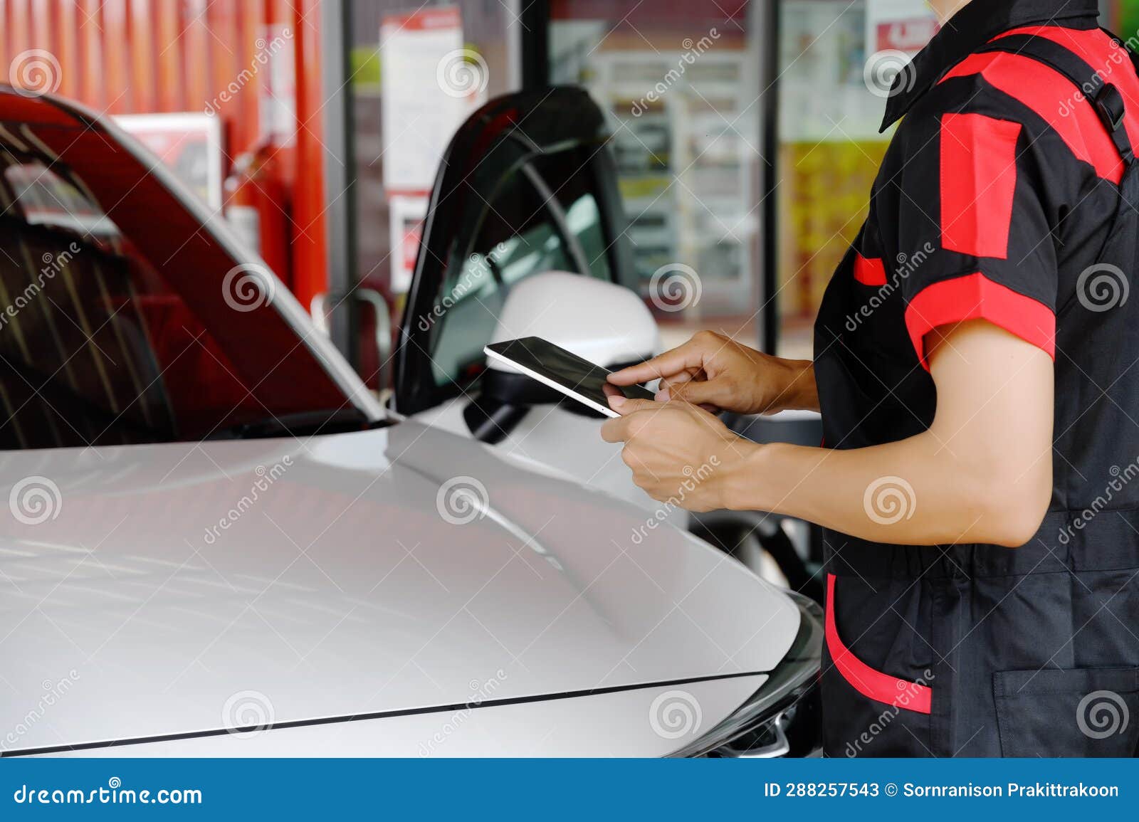 Using Technology a Tablet To Checklist Car Mechanics and Maintains the ...