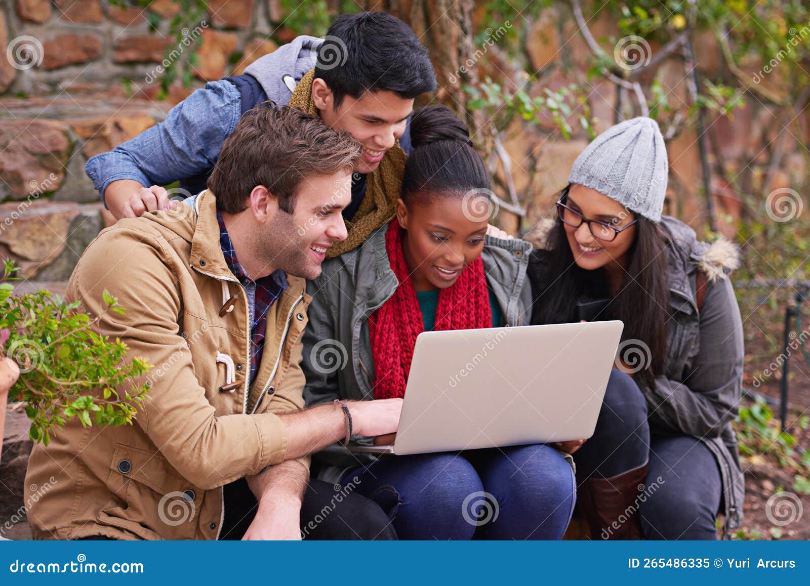 Using Technology To Their Advantage in Their Studies. a Group of ...
