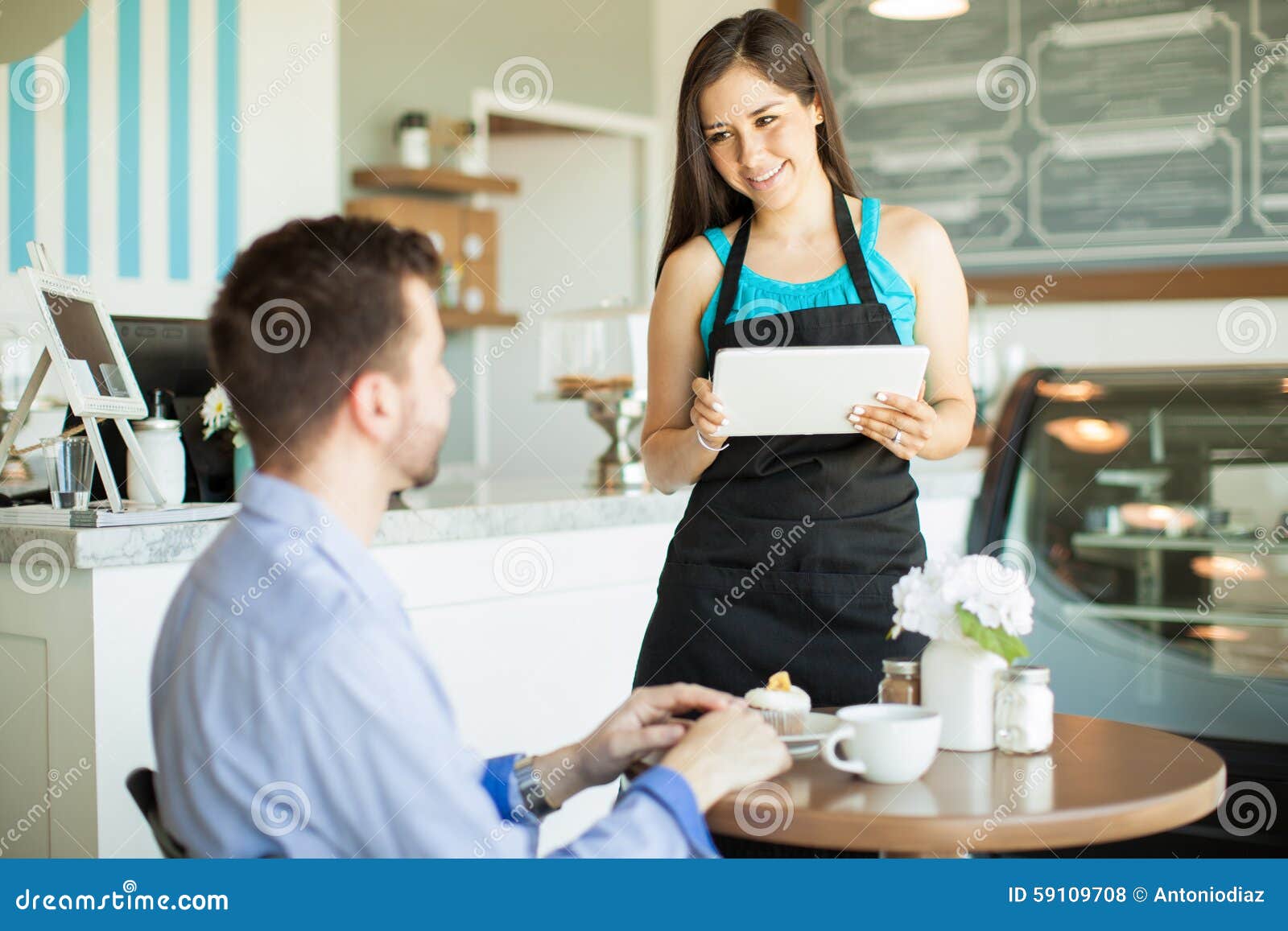 Using Technology for Work in a Cafe Stock Photo - Image of hispanic ...