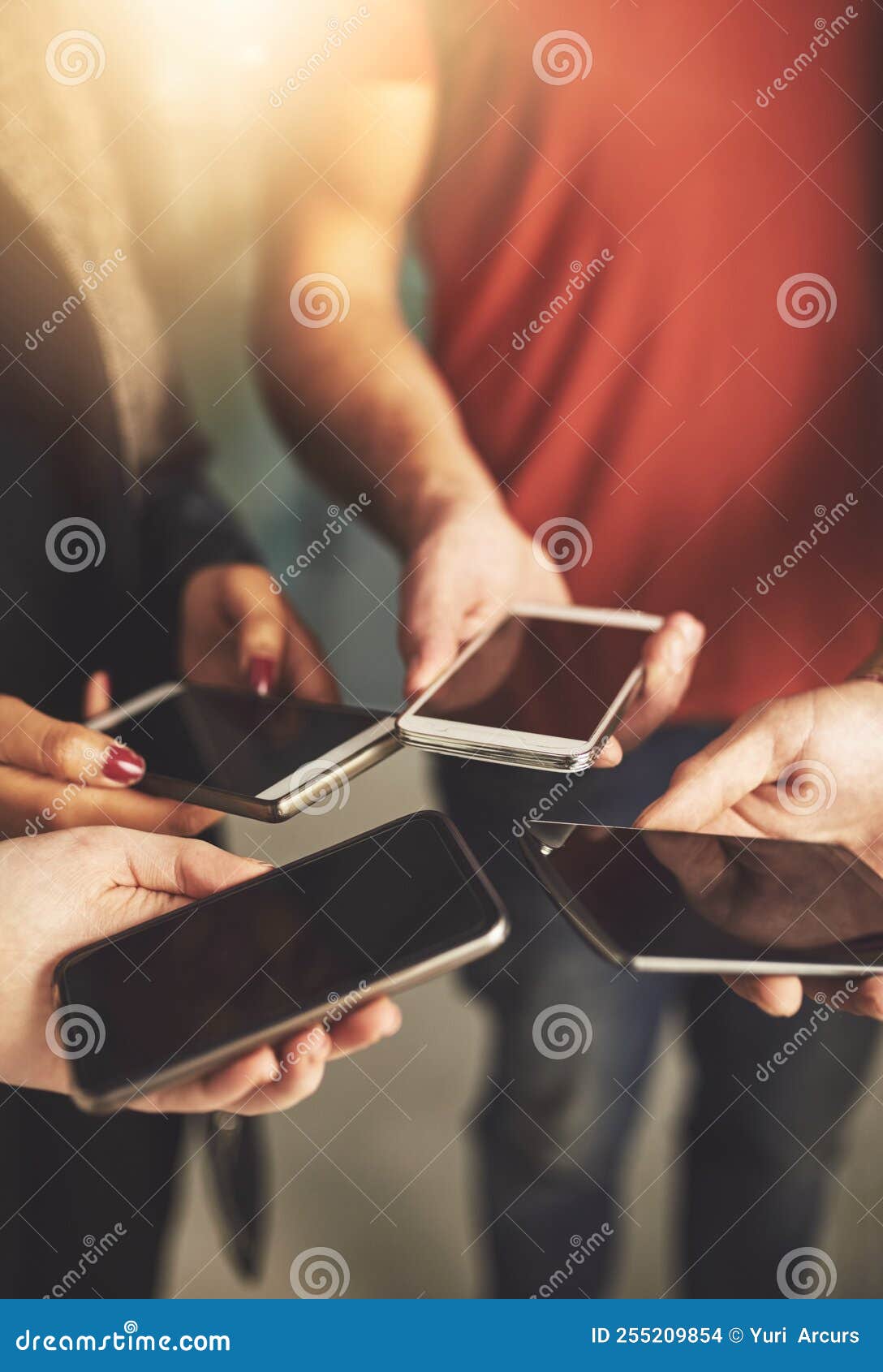 Using Their Cellphones for Research. a Group of Colleagues Using Their ...