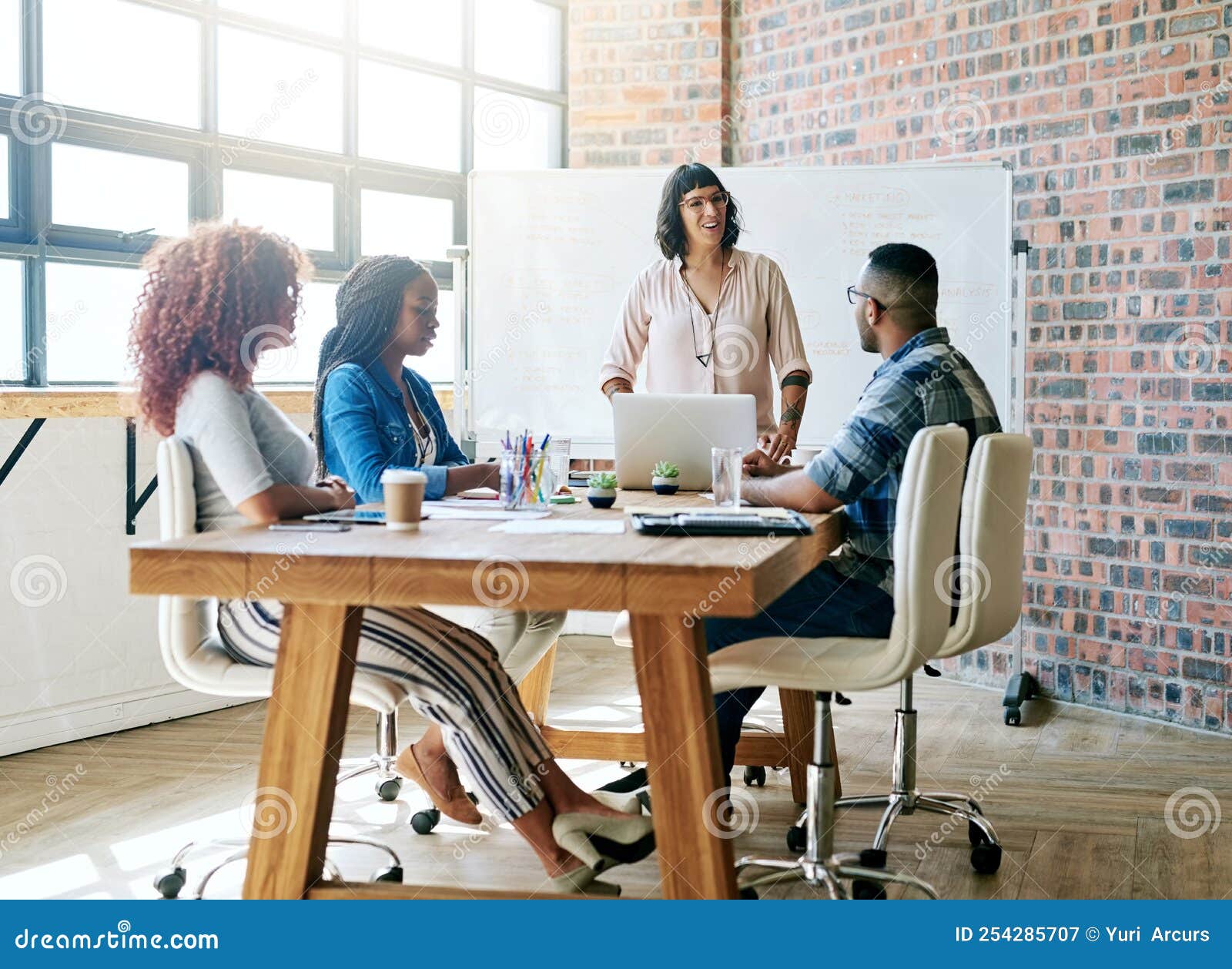 Using Their Resources Wisely. a Businesswoman Giving a Presentation in ...