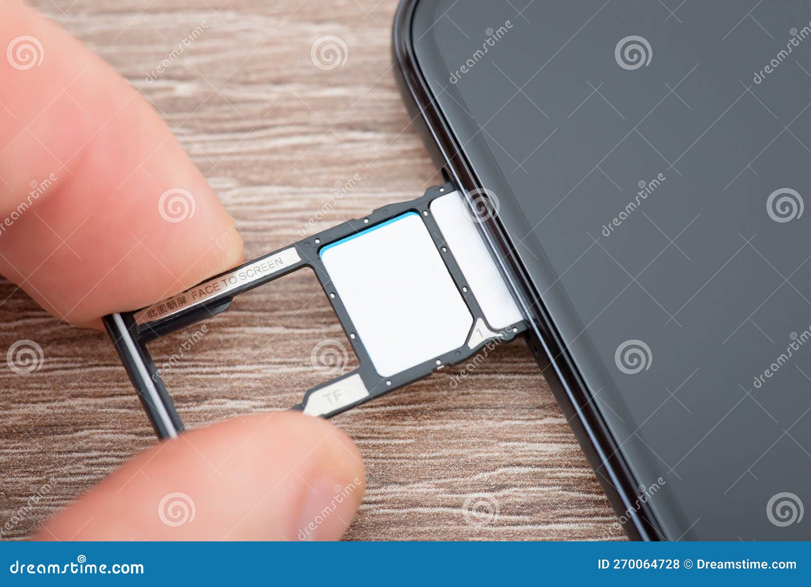 Inserting Tray with Sim Cards To the Phone Stock Photo - Image of ...