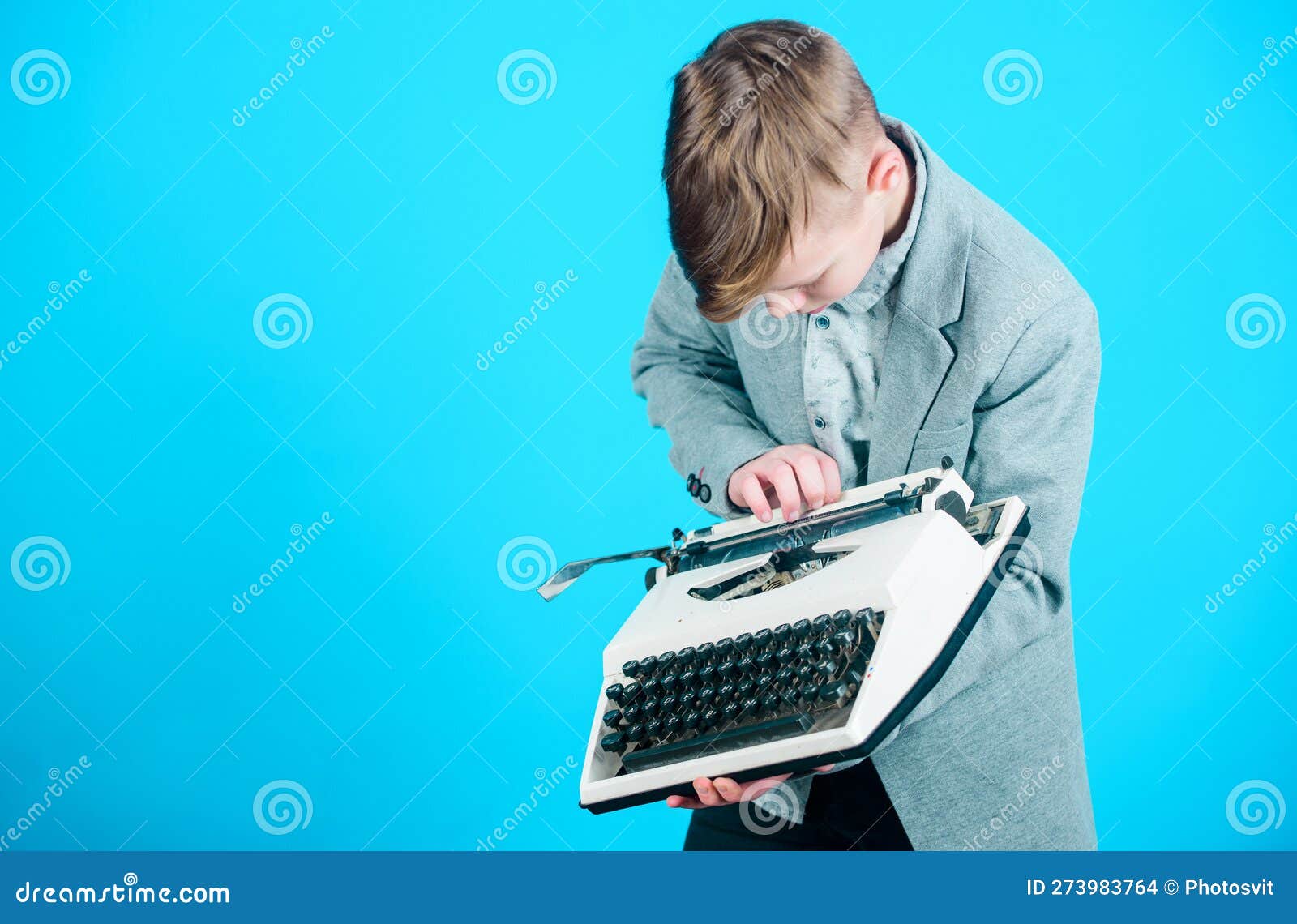 Using a Typing Machine. Small Kid Typewriting on Old Typewriter. Smart ...