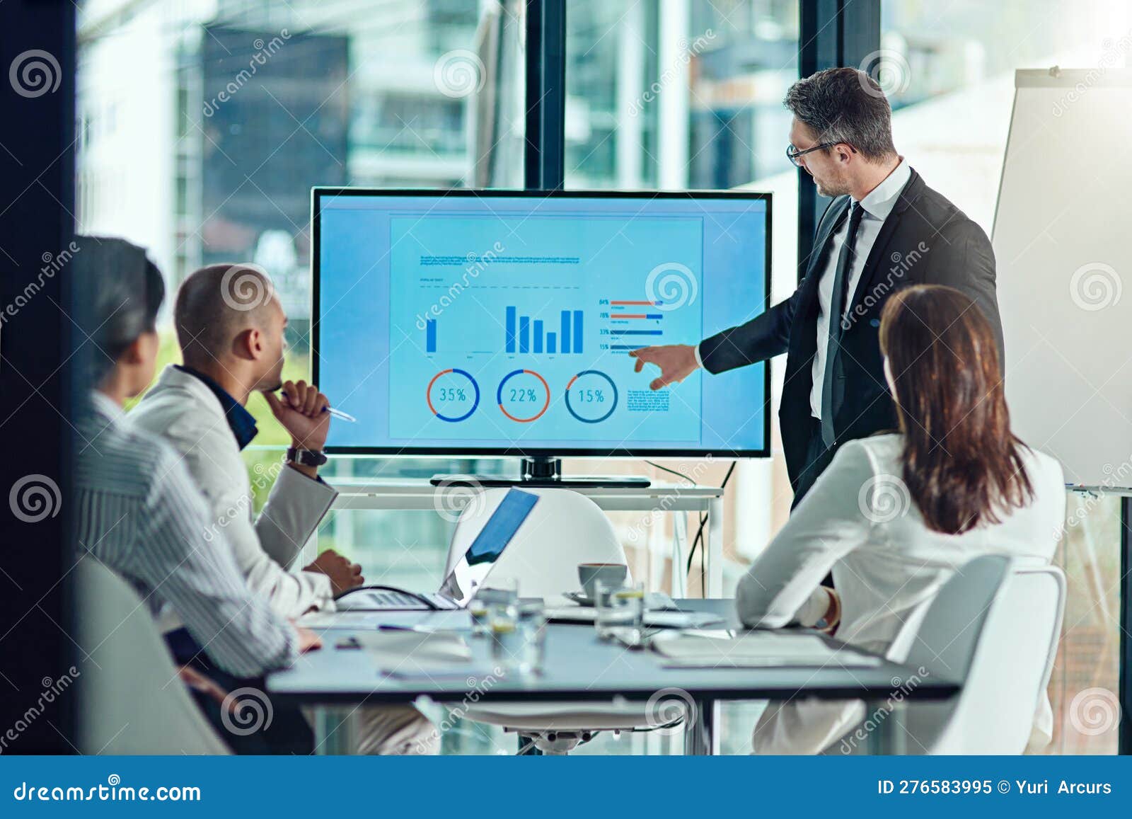 Using a Visual Method To Get His Point Across. a Businessman Delivering ...