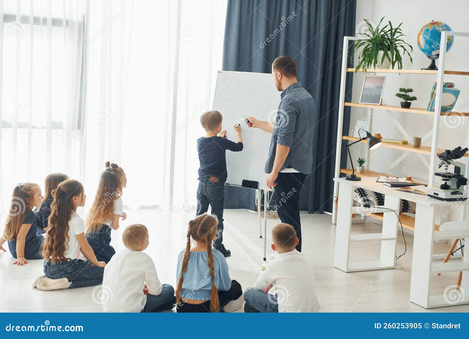 Using Whiteboard. Group of Children Students in Class at School with ...
