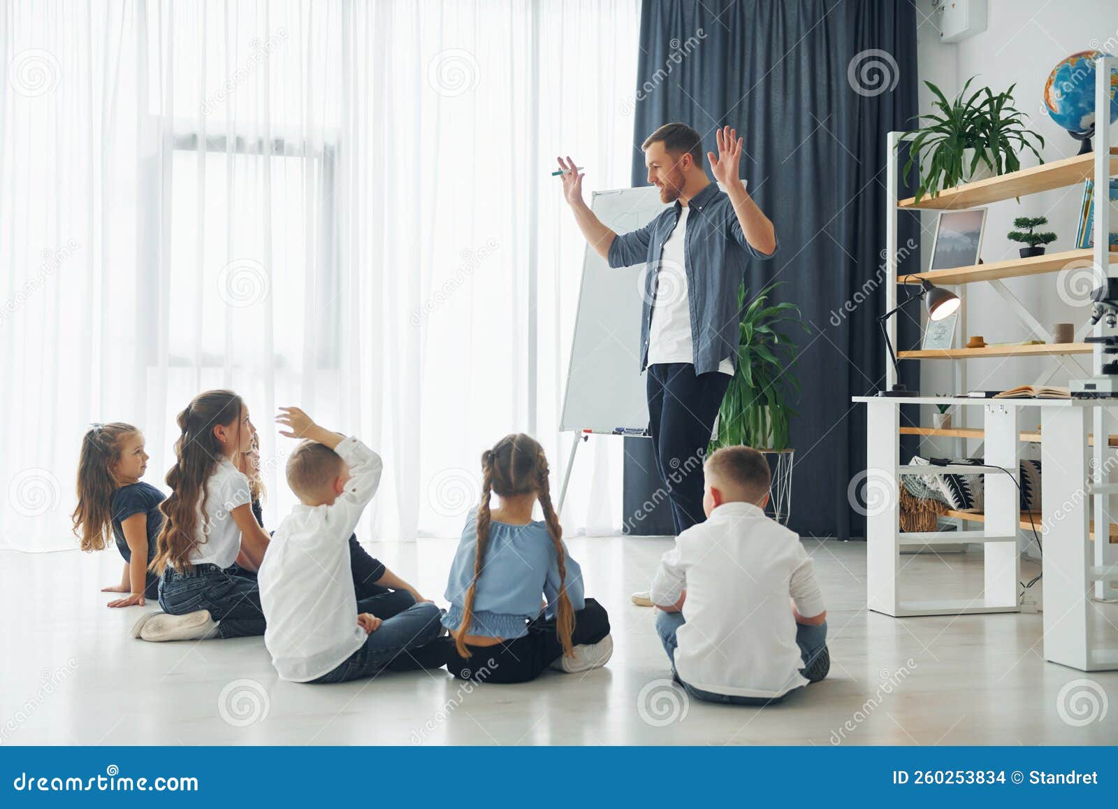 Using Whiteboard. Group of Children Students in Class at School with ...