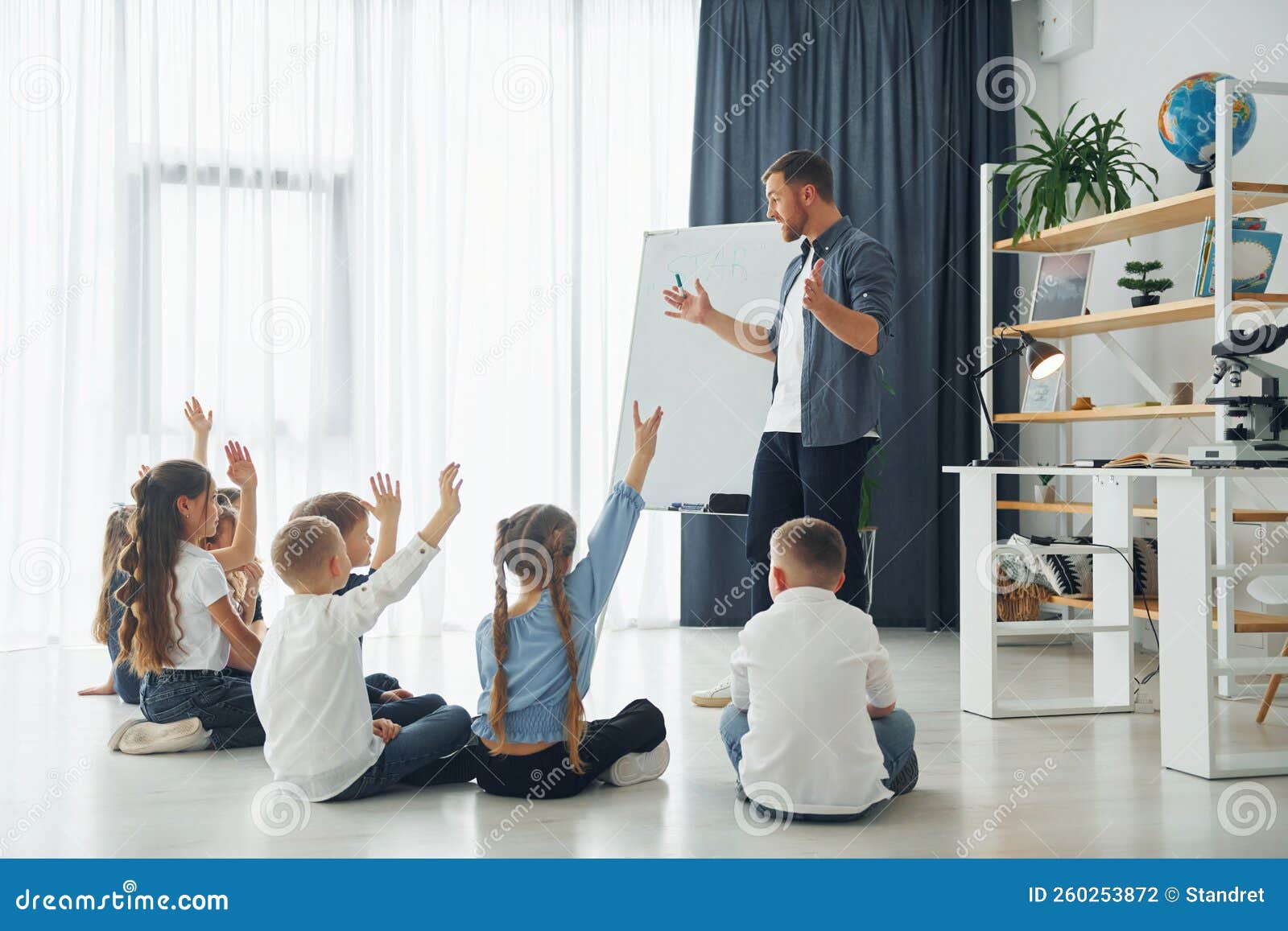 Using Whiteboard. Group of Children Students in Class at School with ...