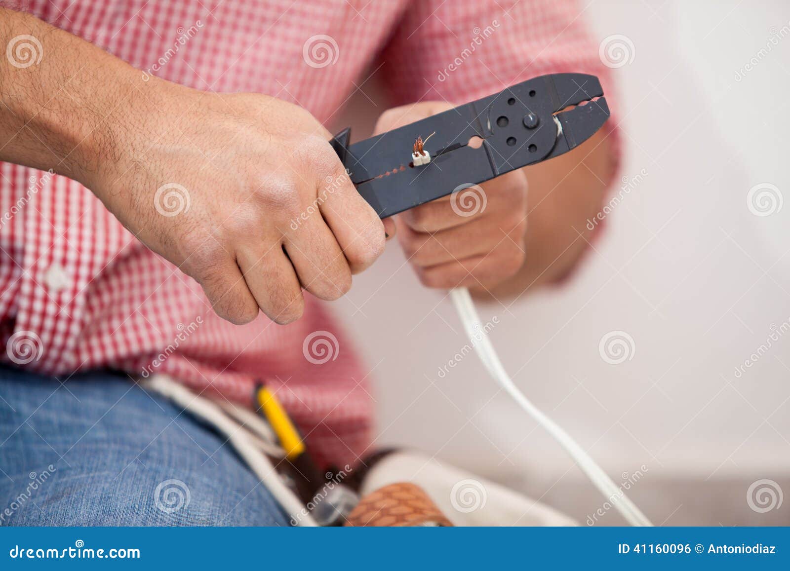 Using a wire stripper stock photo. Image of copy, house - 41160096