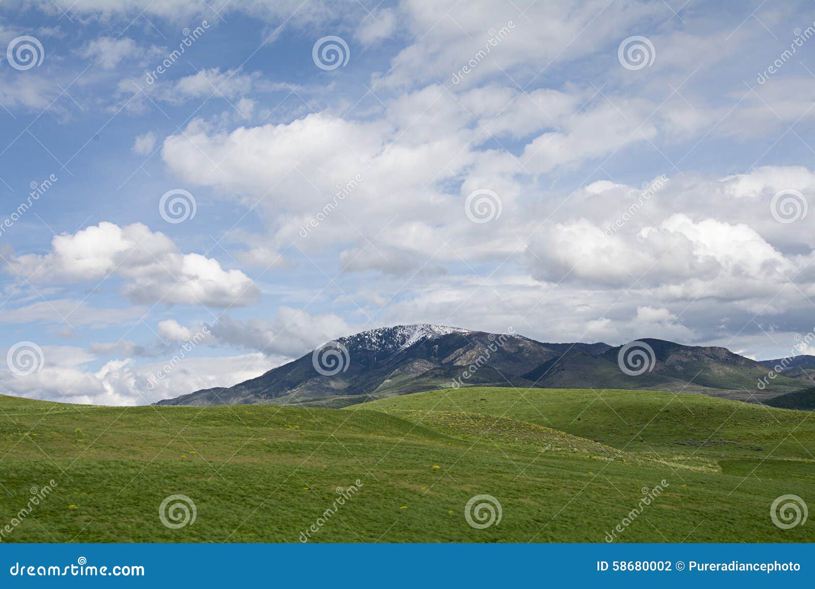 Utah Snow Capped Mountains with Rolling Green Hills Stock Photo - Image ...