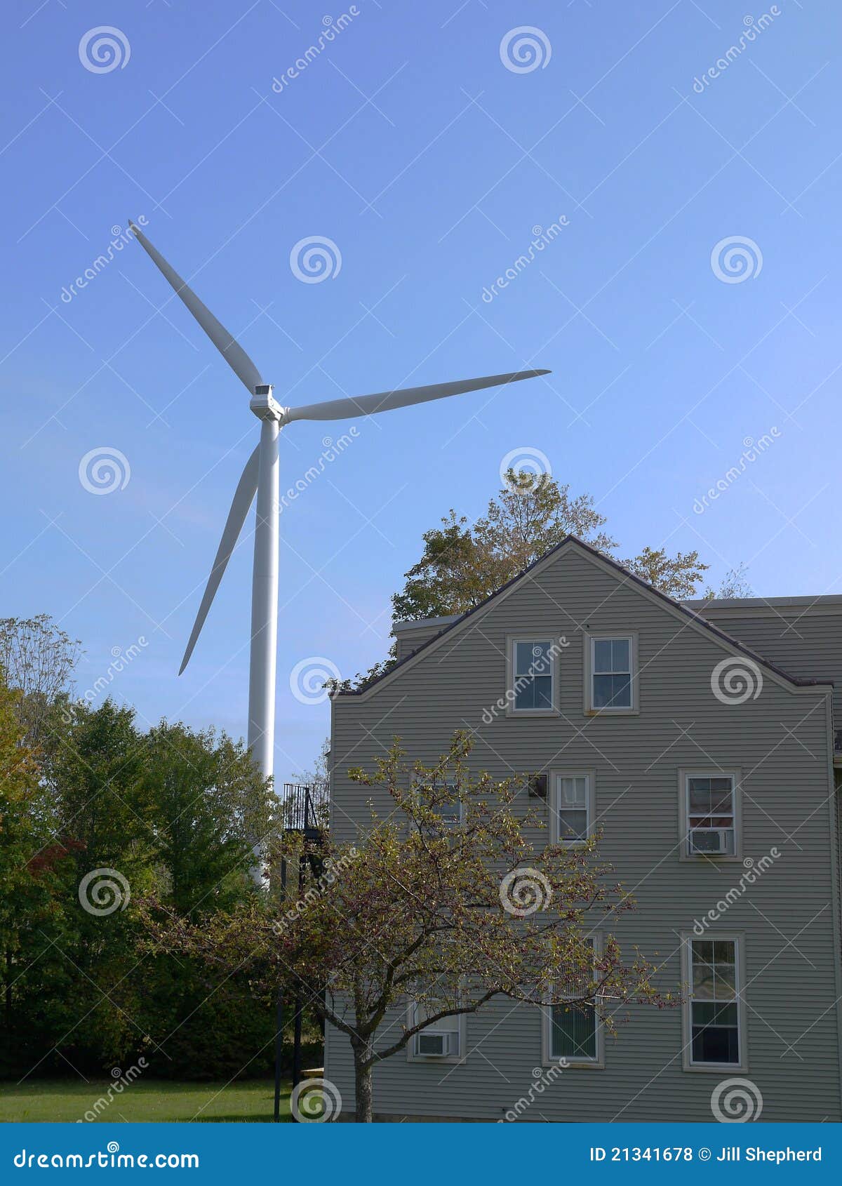 Utilities: Wind Turbine with Apartment Building Stock Photo - Image of ...