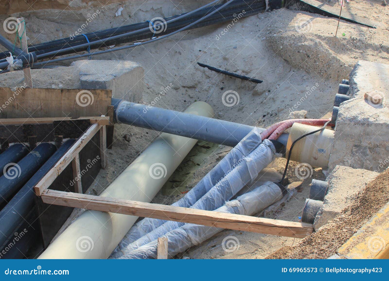 Utility Pipes Being Laid for a New Building Stock Image - Image of ...