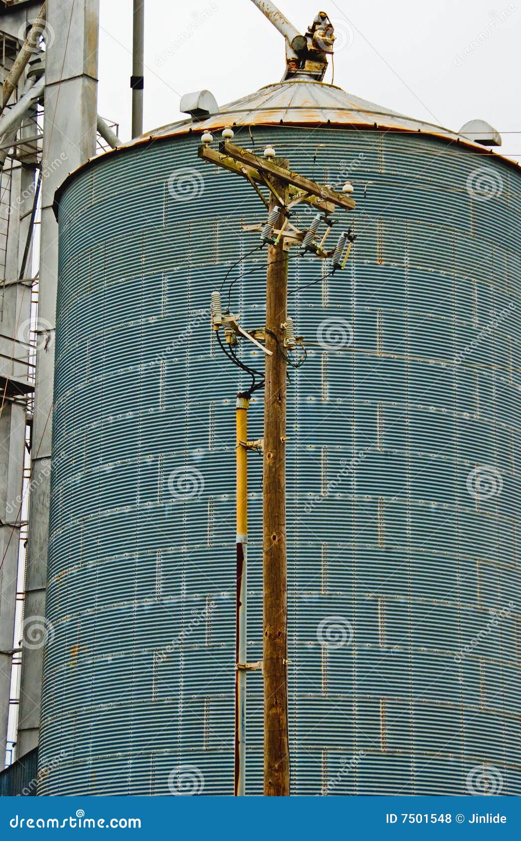 Utility Pole and Storage Silo Stock Photo - Image of industry, brown ...