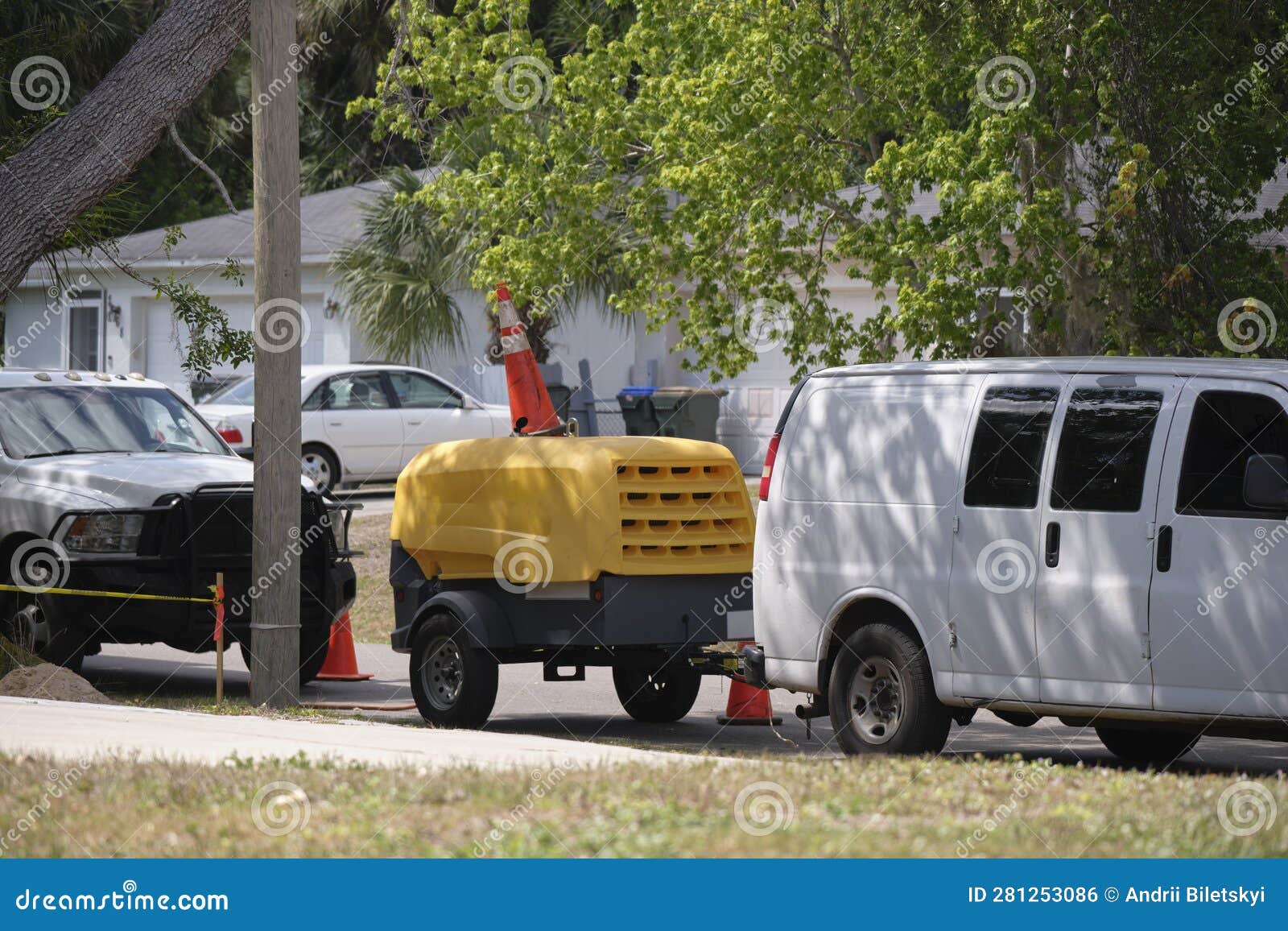 Utility Van with Yellow Compressor Trailer with Jackhammer Machine on ...