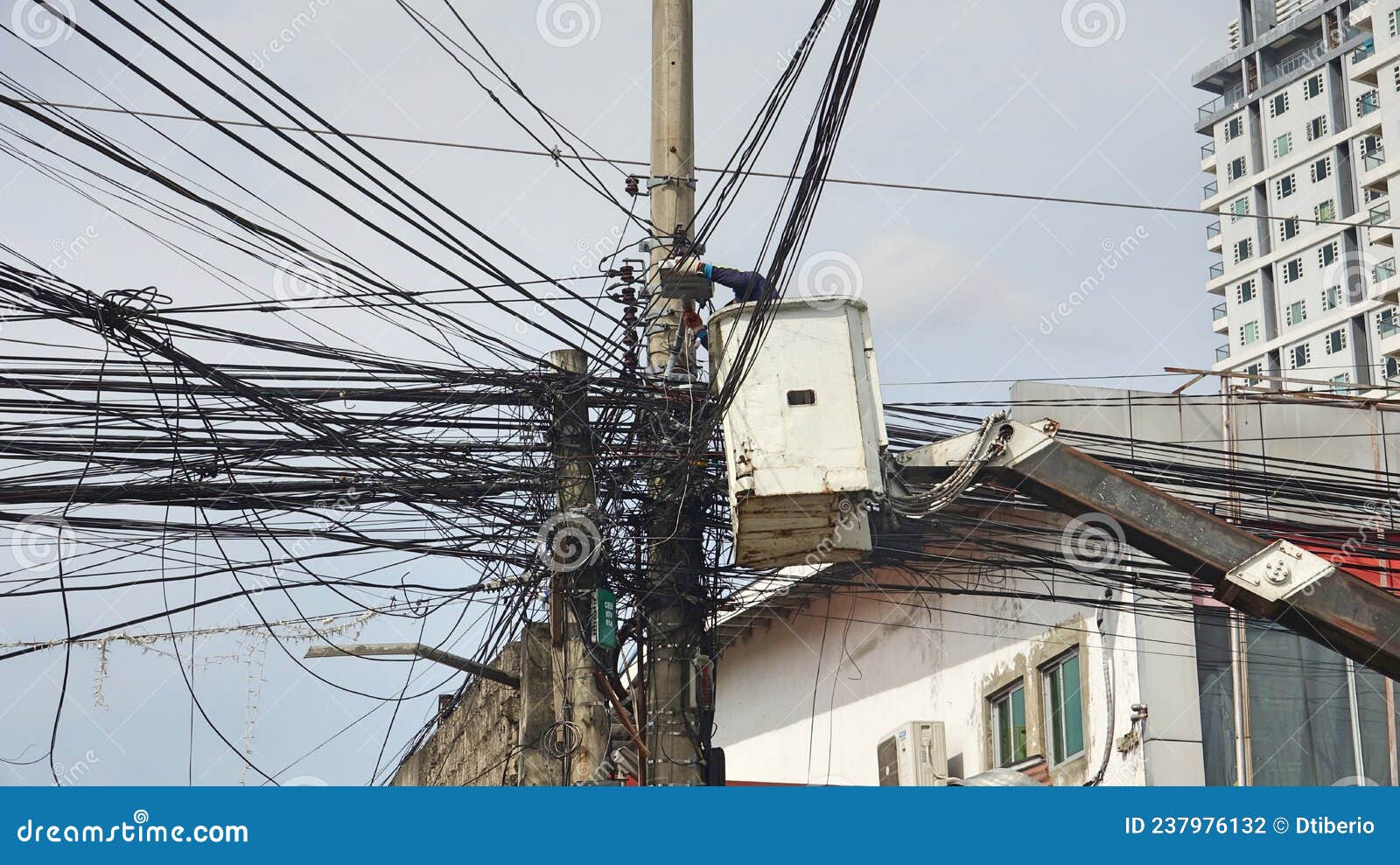 An Utility Worker Fixing Electricity Editorial Photography - Image of ...