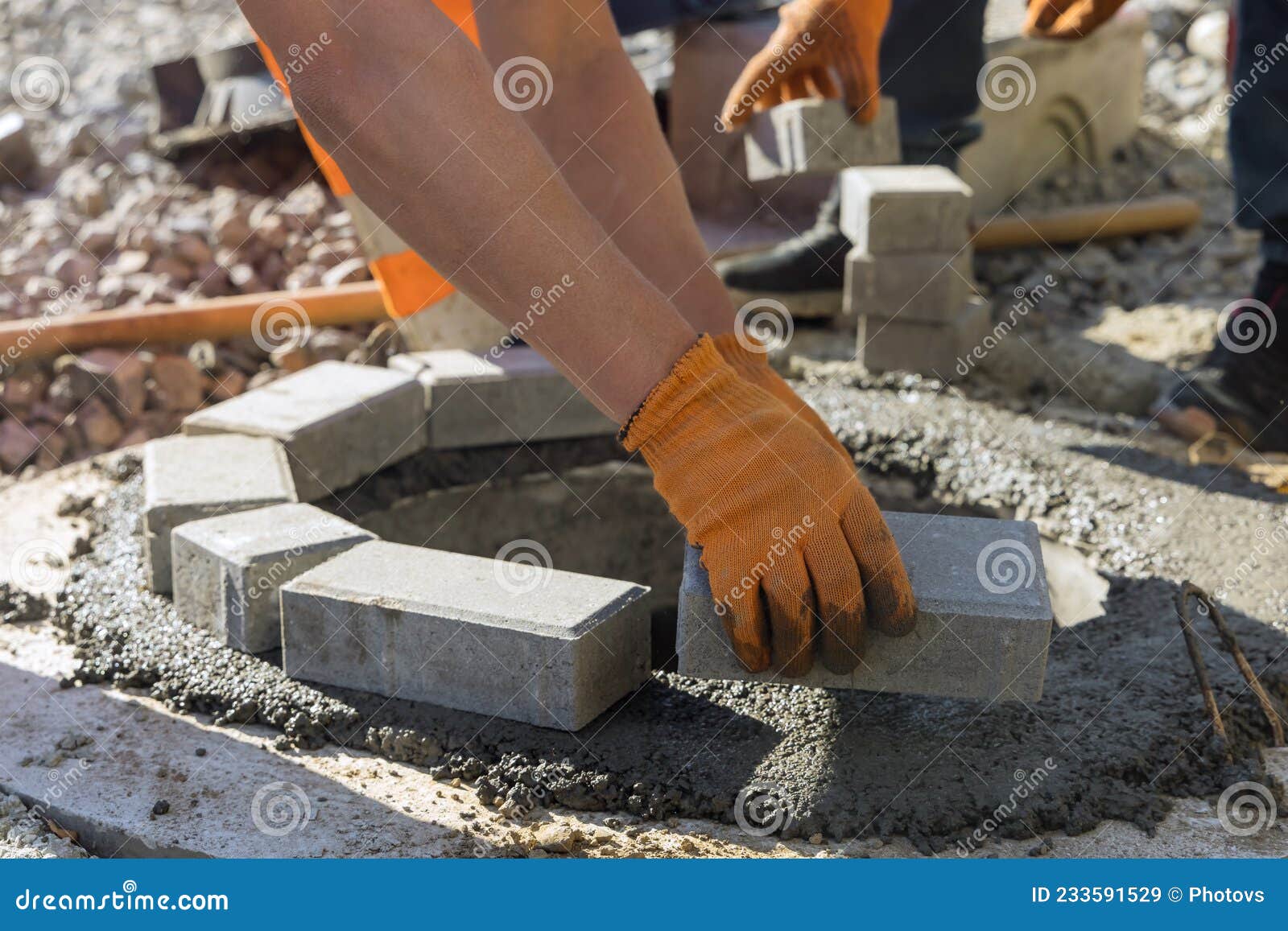 Utility Worker Installing Manhole Sewage Reconstruction a Pit for a ...