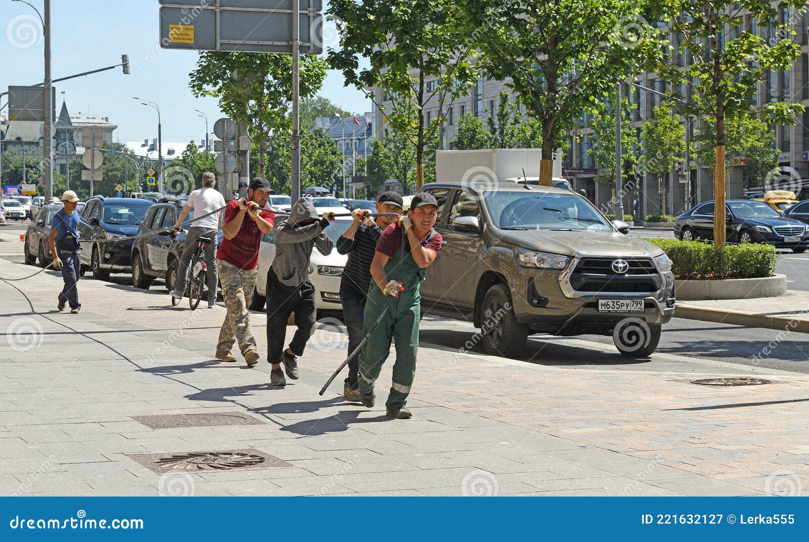 Utility Workers Pulling Cable in Malaya Sukharevskaya Square. Moscow ...