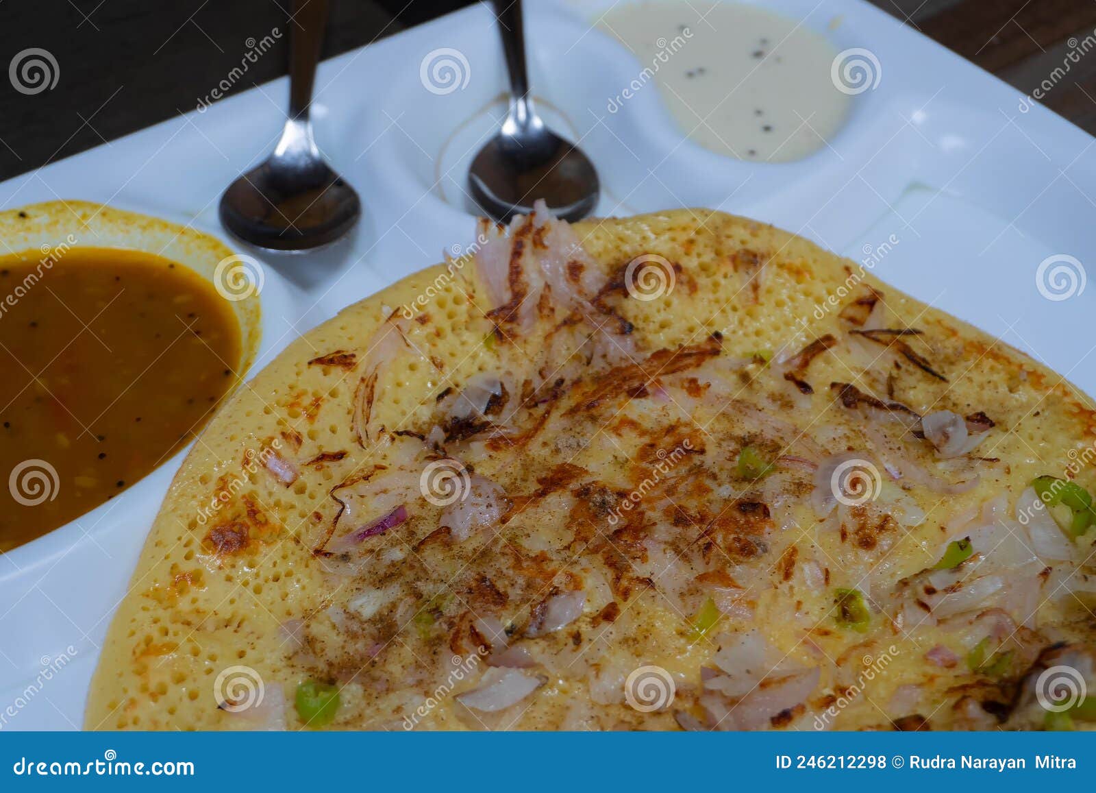 Uttapam is Served with Chutney on White Plate,Indian Vegetable Dish ...
