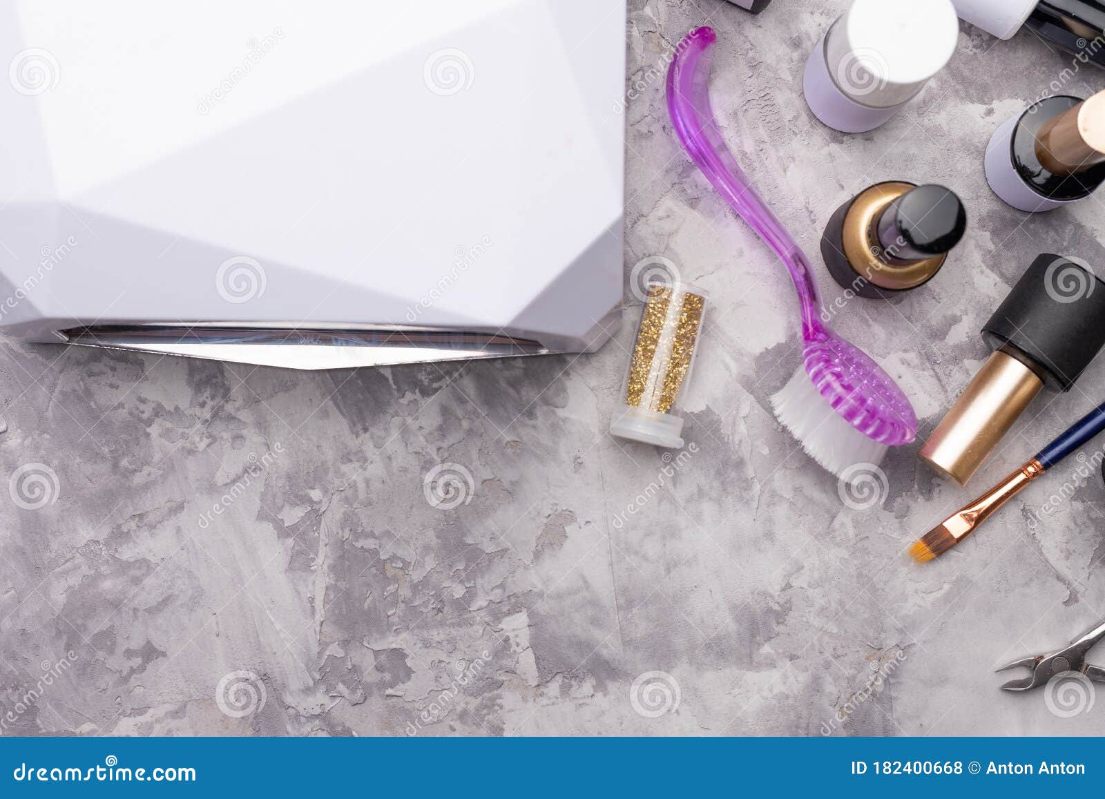 UV Manicure Nail Care Tools. on Concrete Texture with Space Stock Photo ...