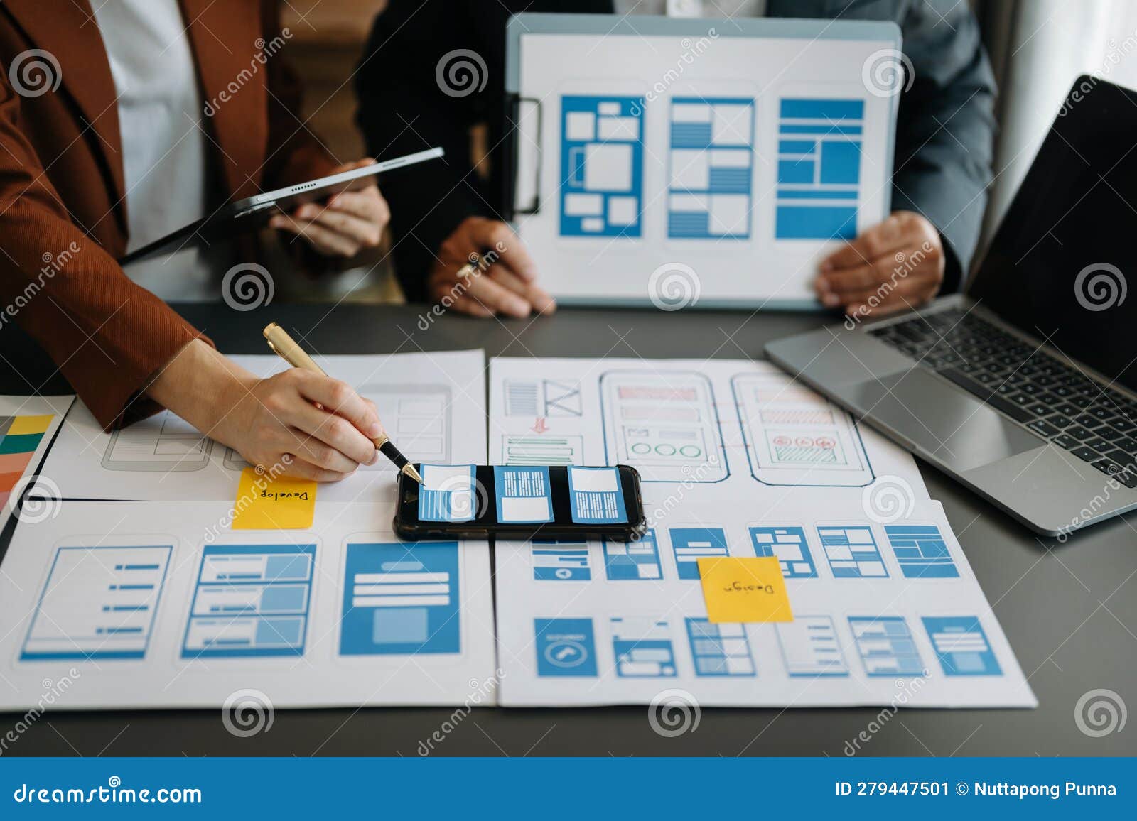 UX Developer and Ui Designer Brainstorming about Mobile App Interface Wireframe Design with ...