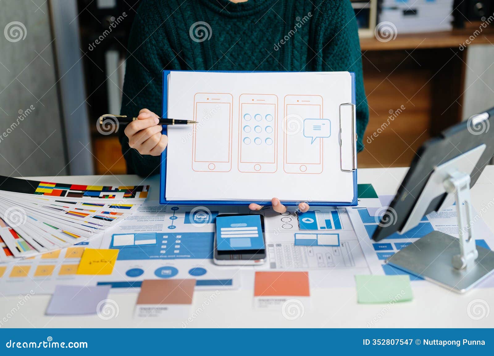 Ux Developer And Ui Designer Brainstorming About Mobile App Interface Wireframe Design With