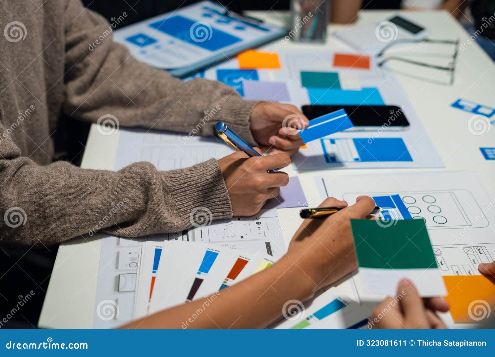 UX Developer and Ui Designer Brainstorming about Mobile App Interface ...