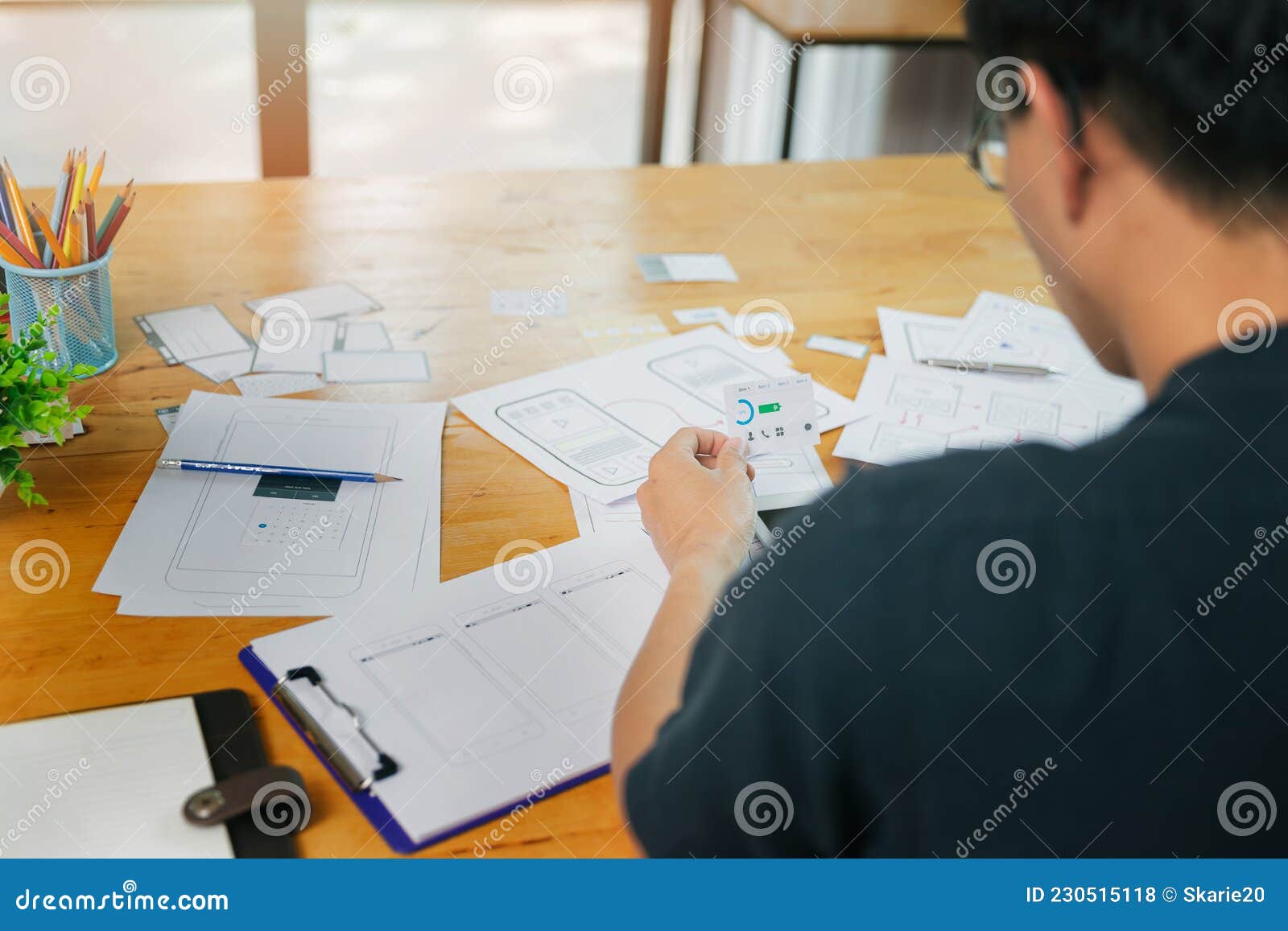 UX or UI Designers Designing on Digital Tablet and Smartphone ...