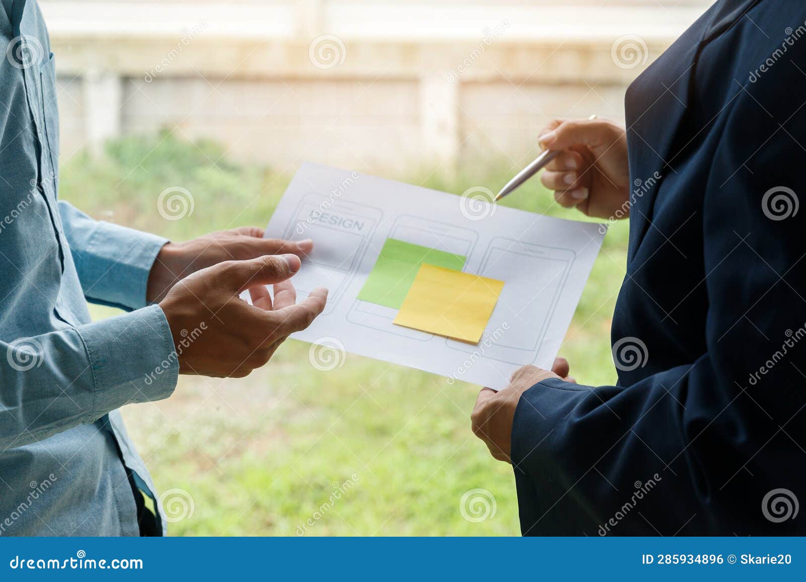 UX or UI Designers Designing on Their Smartphone Application Layout ...