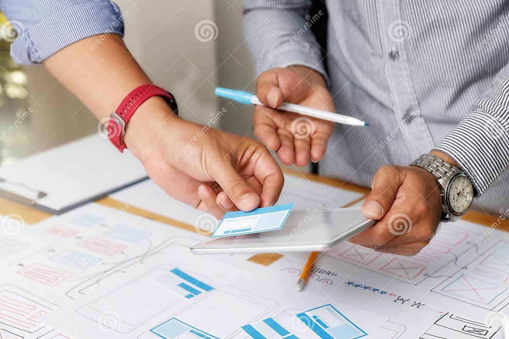 UX or UI Designers Designing on Their Smartphone Application Layout ...