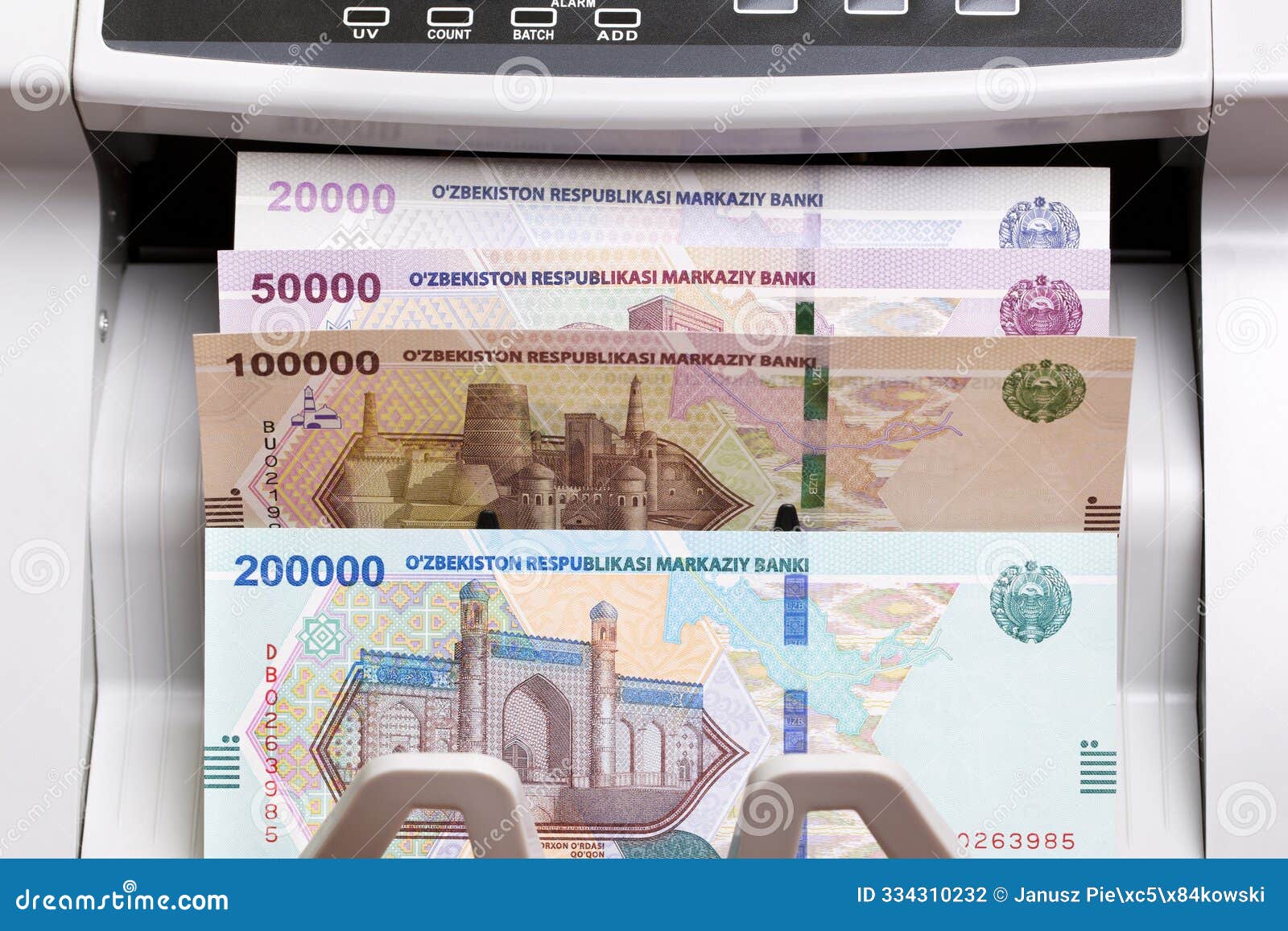 Uzbekistani Sum in the Counting Machine Stock Photo - Image of machine ...