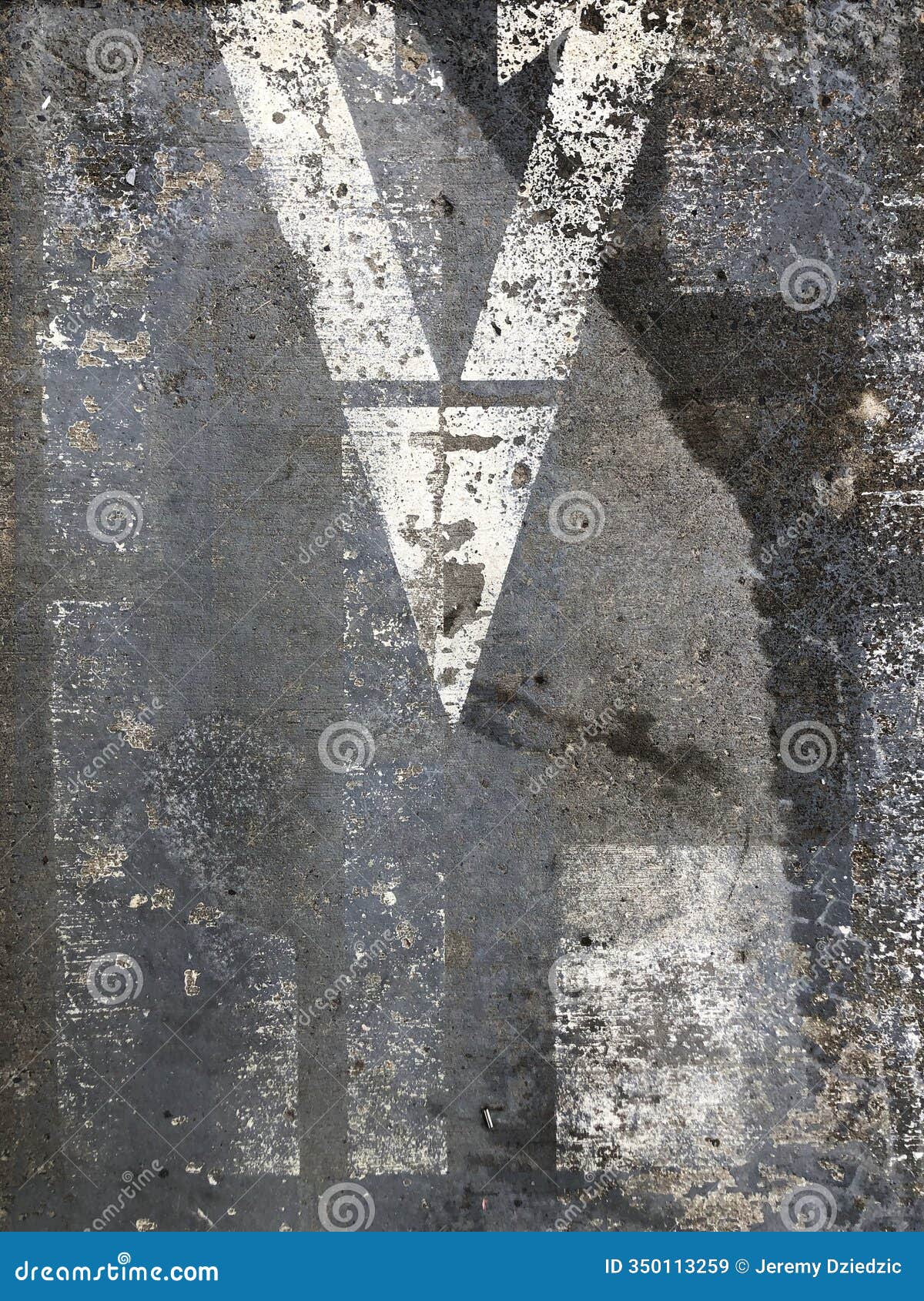 A Worn Out Distressed V Painted on the Ground Stock Image - Image of ...