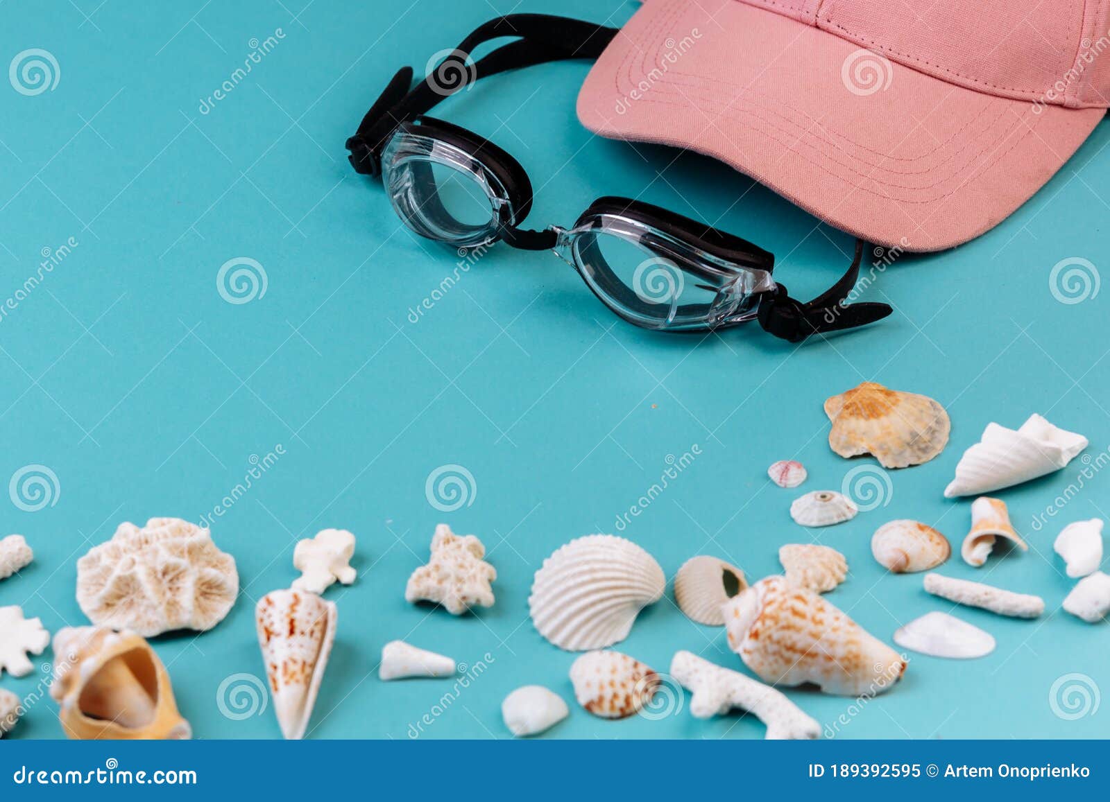 Vacation Concept: Cap, Swimming Goggles, Different Kinds of Seashells ...
