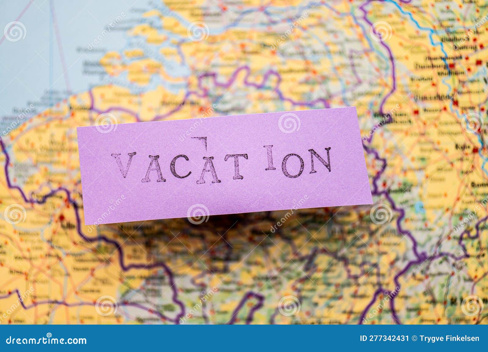Vacation Stencil Text on Purple Paper Over a Map.. Stock Image - Image ...