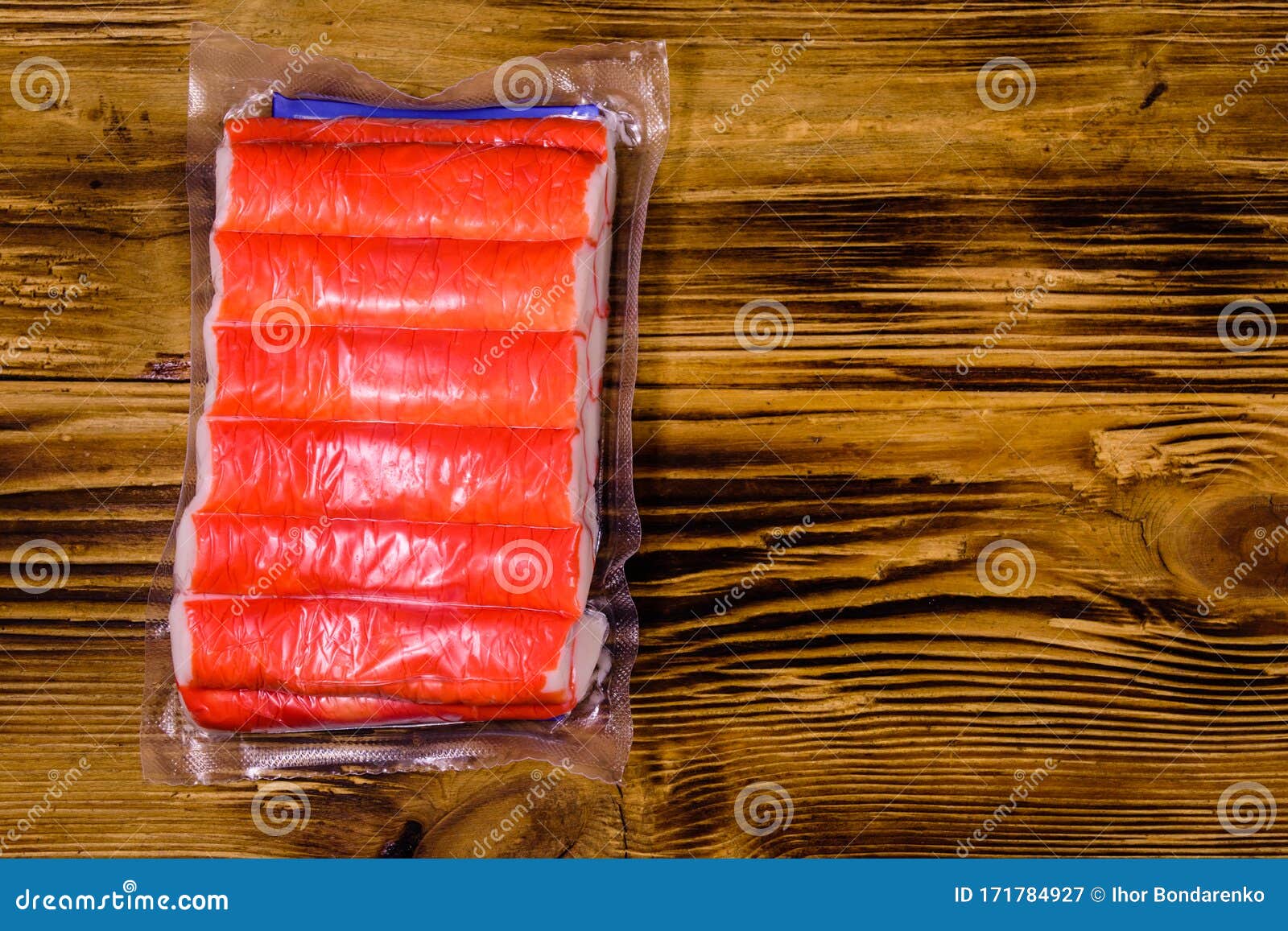 Vacuum Pack of Crab Sticks on a Wooden Table. Top View Stock Image ...