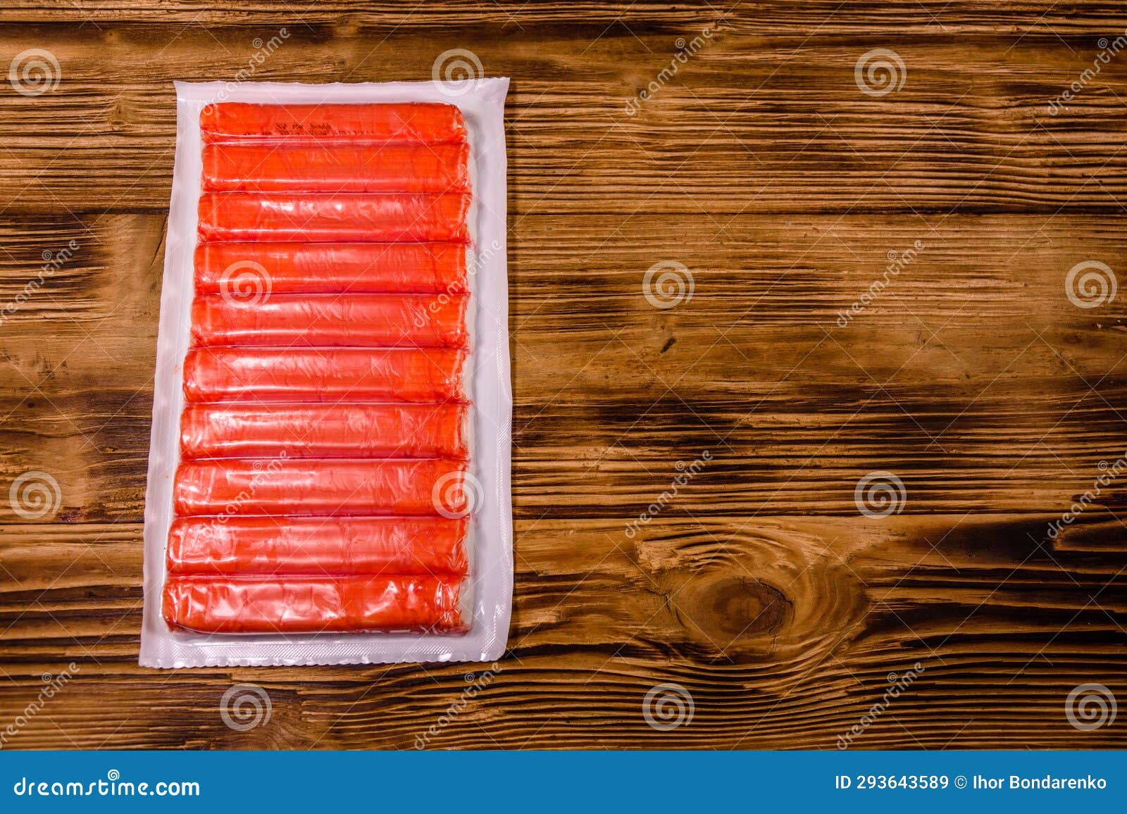 Vacuum Pack of Crab Sticks on a Wooden Table. Top View Stock Image ...