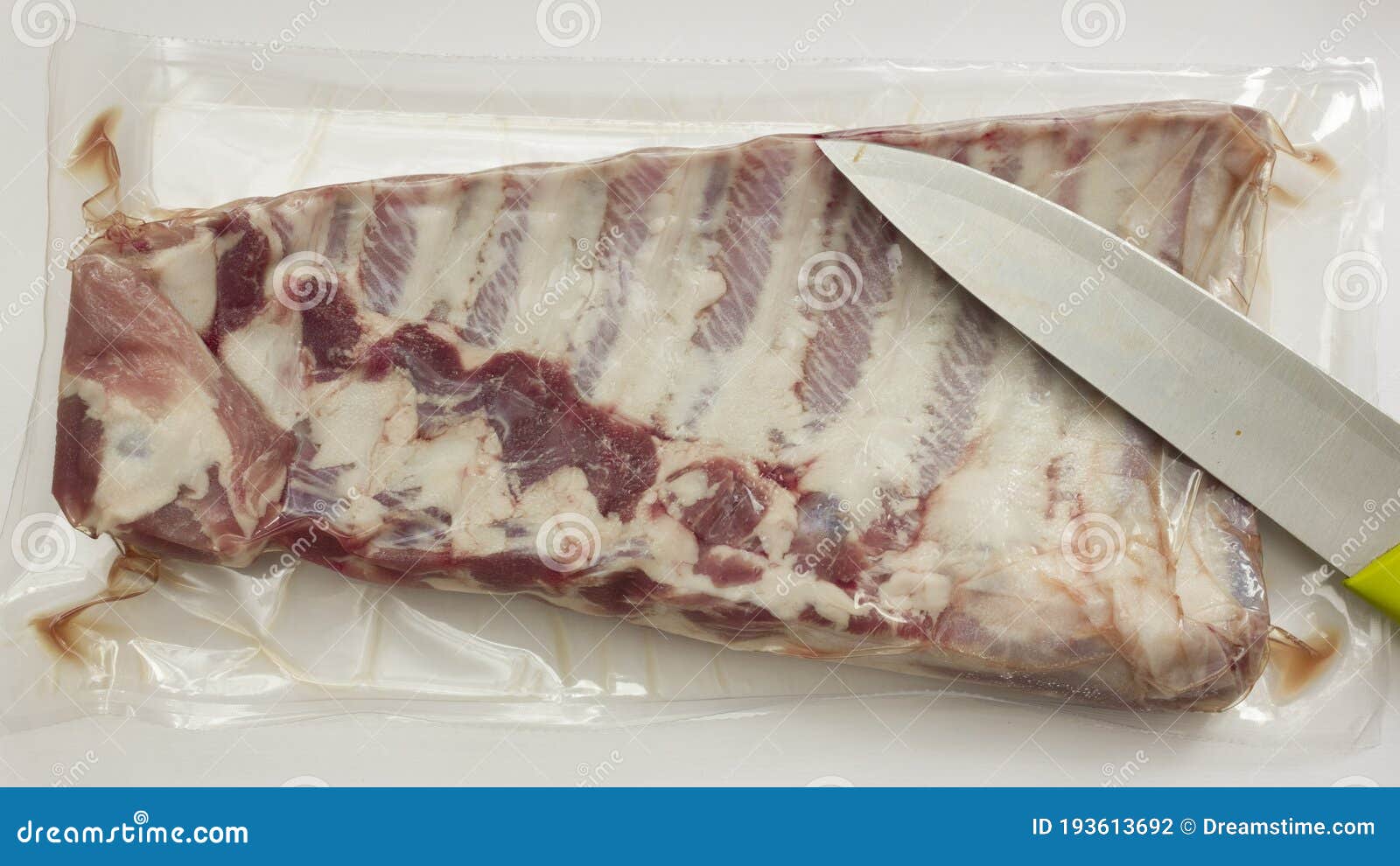 Vacuum Packed Fresh Pork Ribs Meat Isolated on White Stock Photo ...
