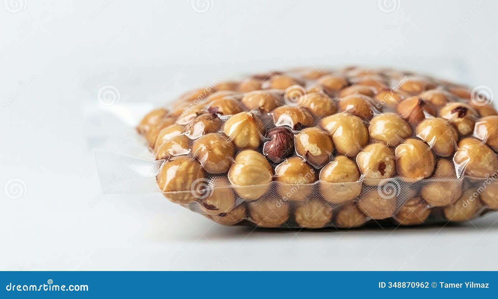 Vacuum-packed Hazelnuts in a Transparent Plastic Bag Insulated on a ...