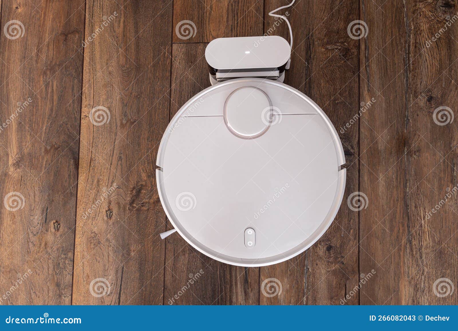 Vacuum Robot Cleaning at Home. Robot Vacuum Cleaner in the Modern Home ...