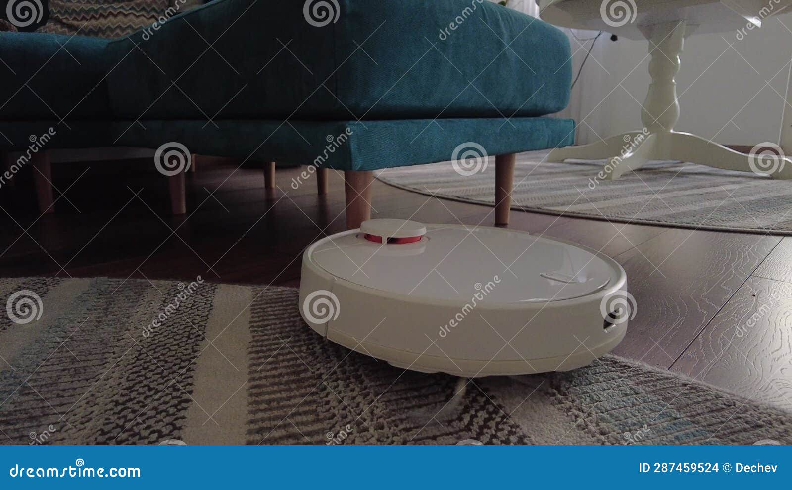 Vacuum Robot Cleaning at Home. Robot Vacuum Cleaner in the Modern Home ...
