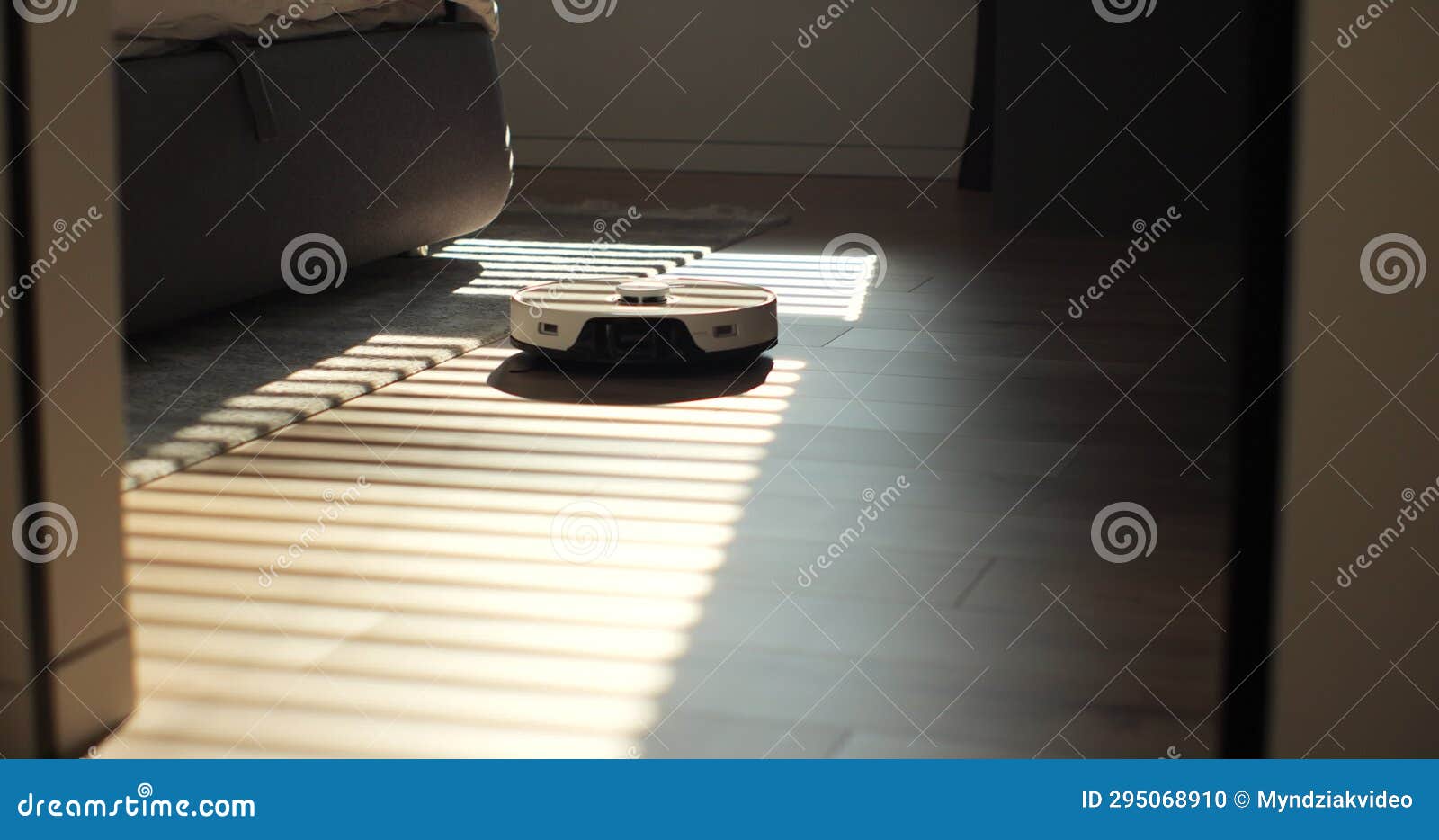 Vacuum Robot Cleaning at Home. Robot Vacuum Cleaner in the Modern Home ...