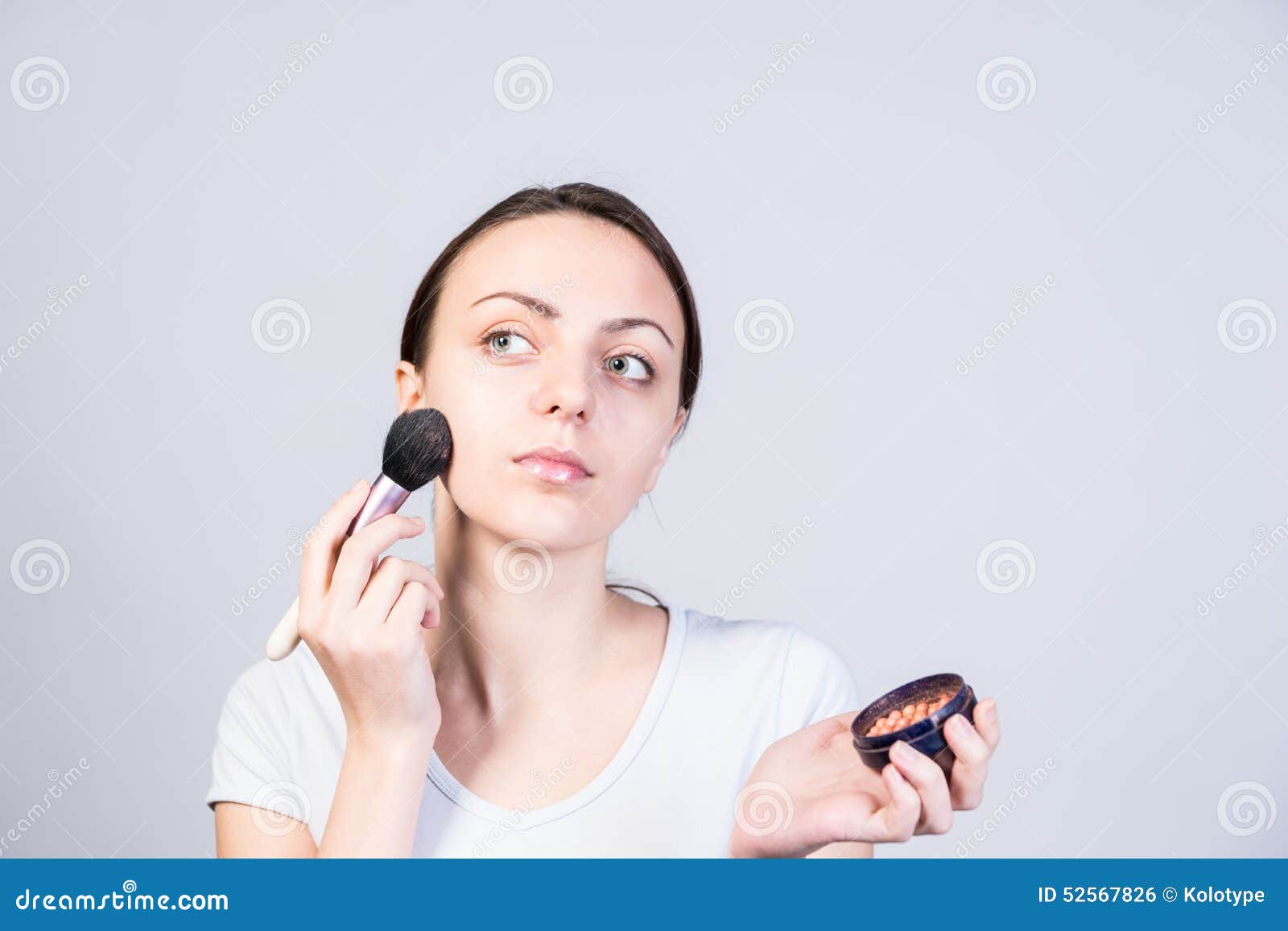 Vain Girl Applying Foundation Makeup on Her Face Stock Photo - Image of ...