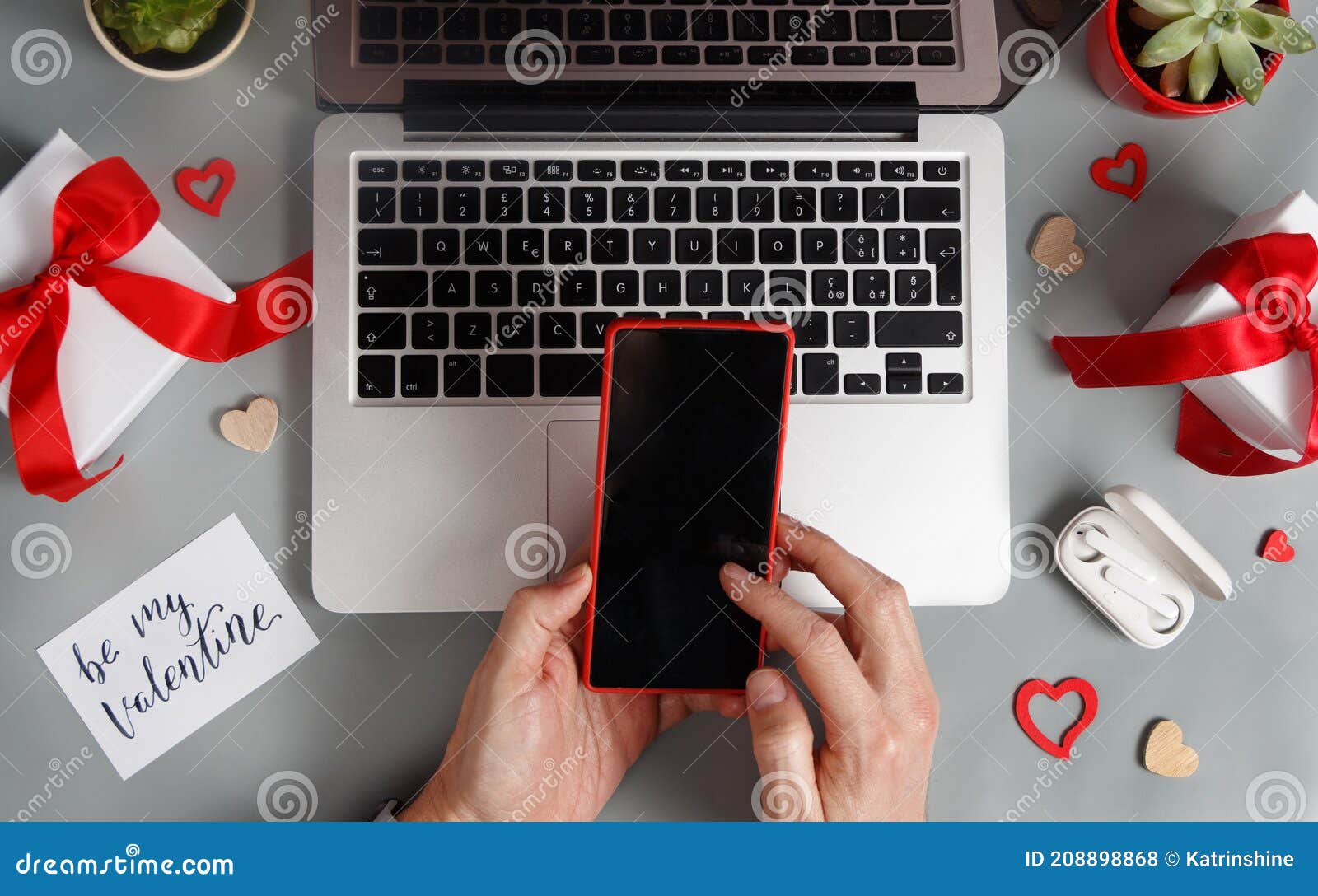 Valentines Day Concept with Modern Gadgets and Hands Using Smartphone ...