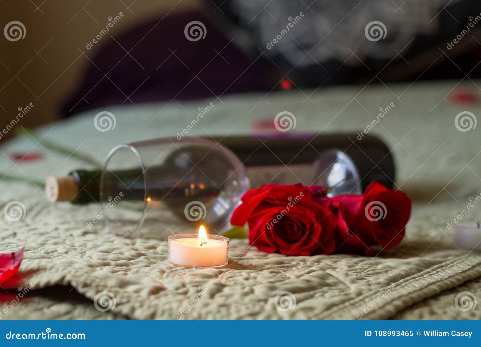 Valentines Day Wine and Roses on Bed with Tea Light Stock Image - Image ...
