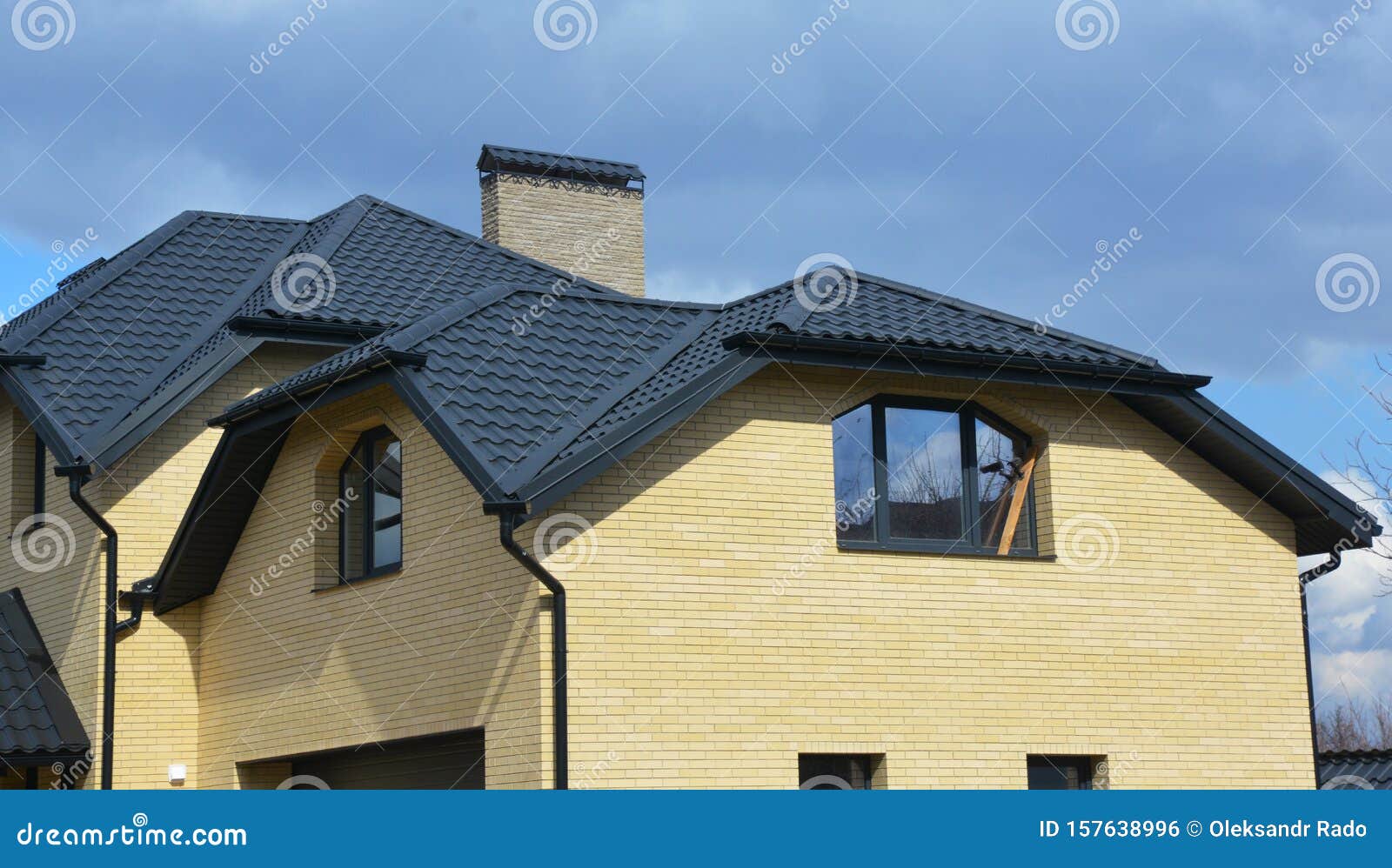 Valley And Gable Roofing Construction With Attic Windows, Rain Gutter ...