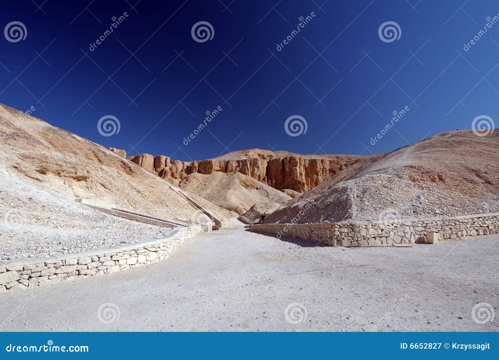 Pathway Through Egyptian Ruins With Pyramid In Background Stock ...