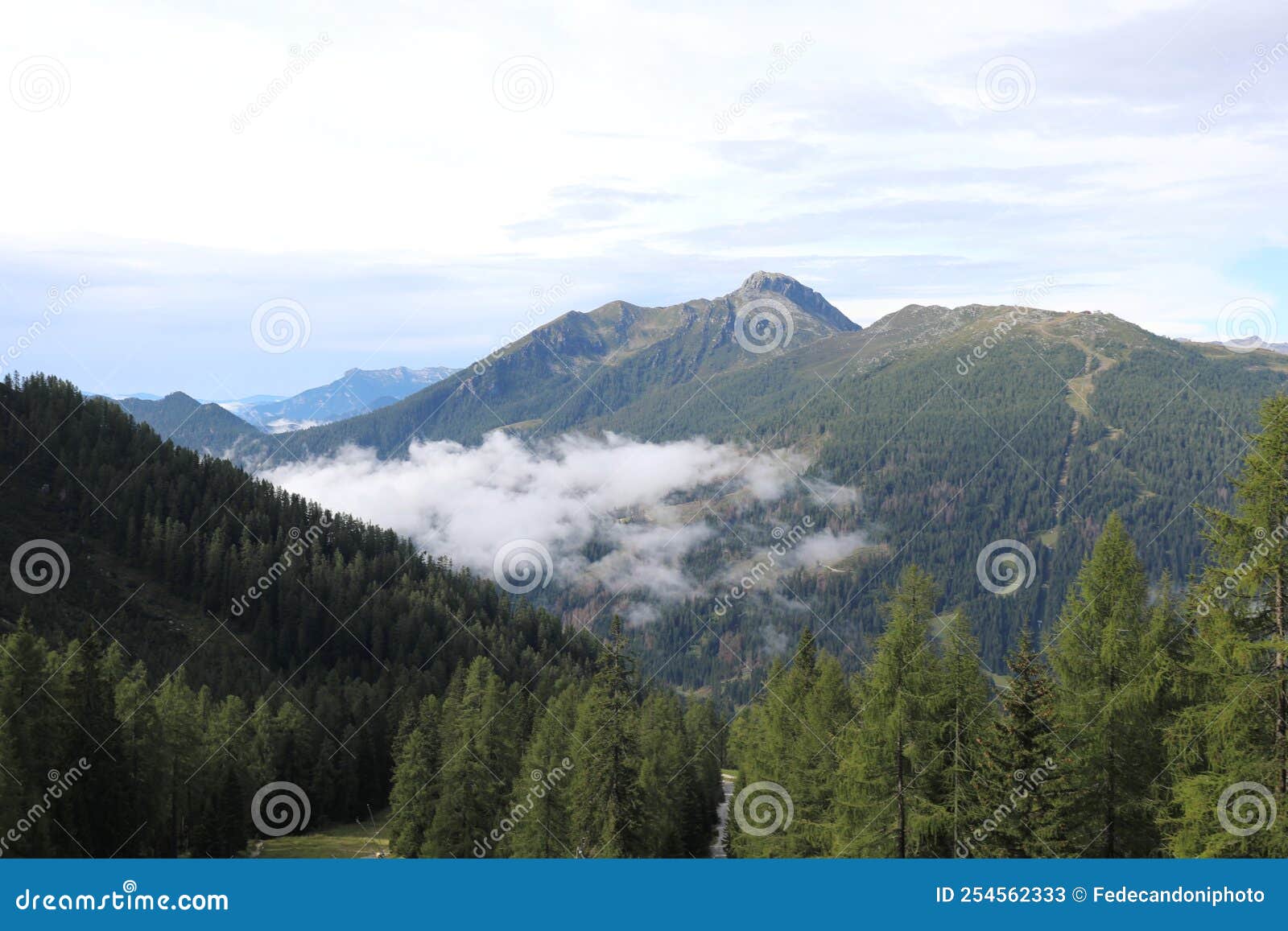 Valley in the Middle of the Mountains with Clouds Stock Image - Image ...