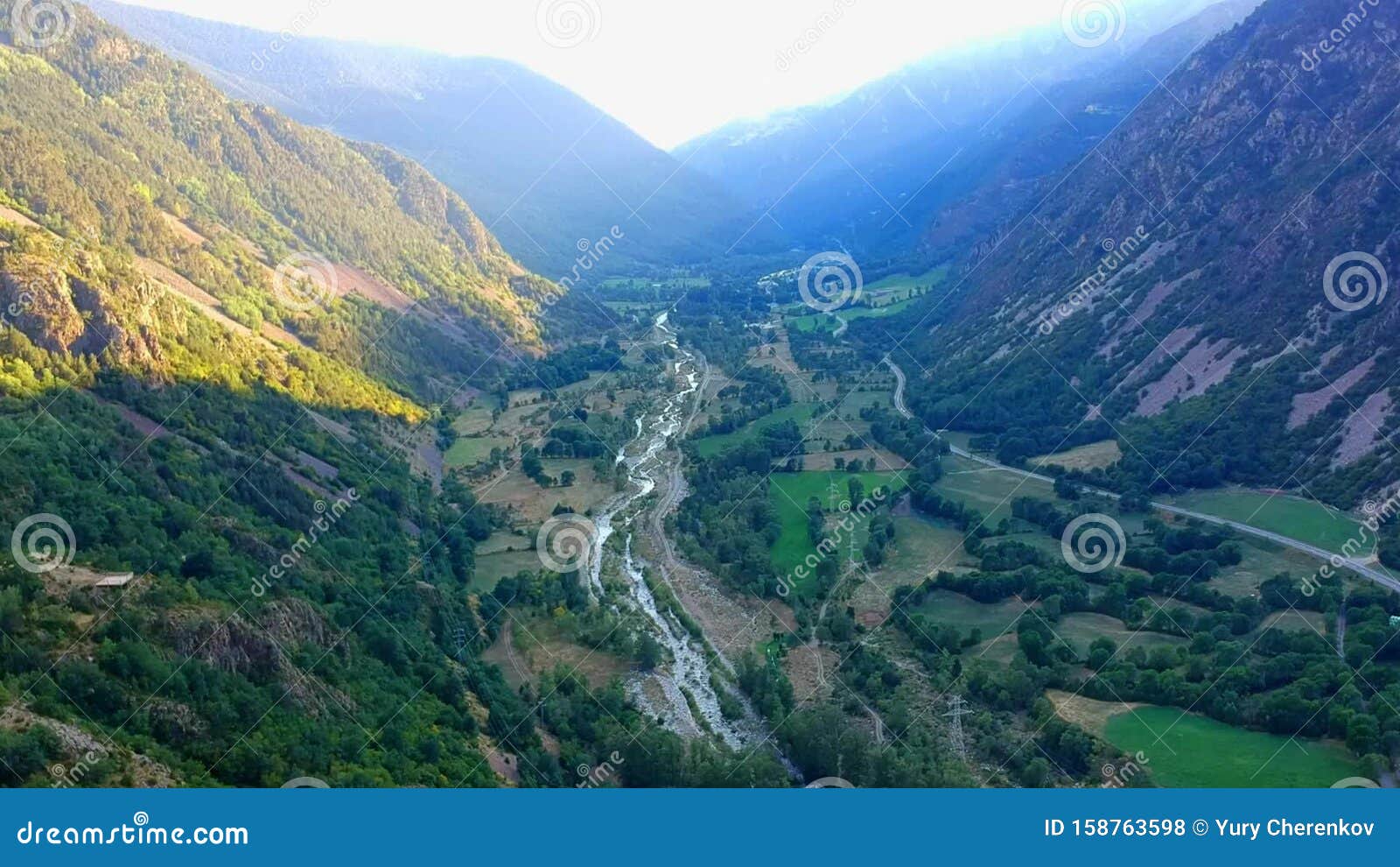 Valley between the Mountains with a Mountain River. View from the Drone ...