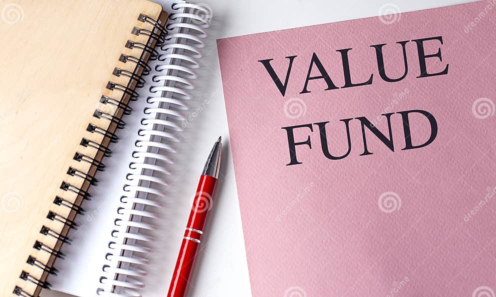 VALUE FUND Text on Pink Paper with Notebooks Stock Image - Image of ...